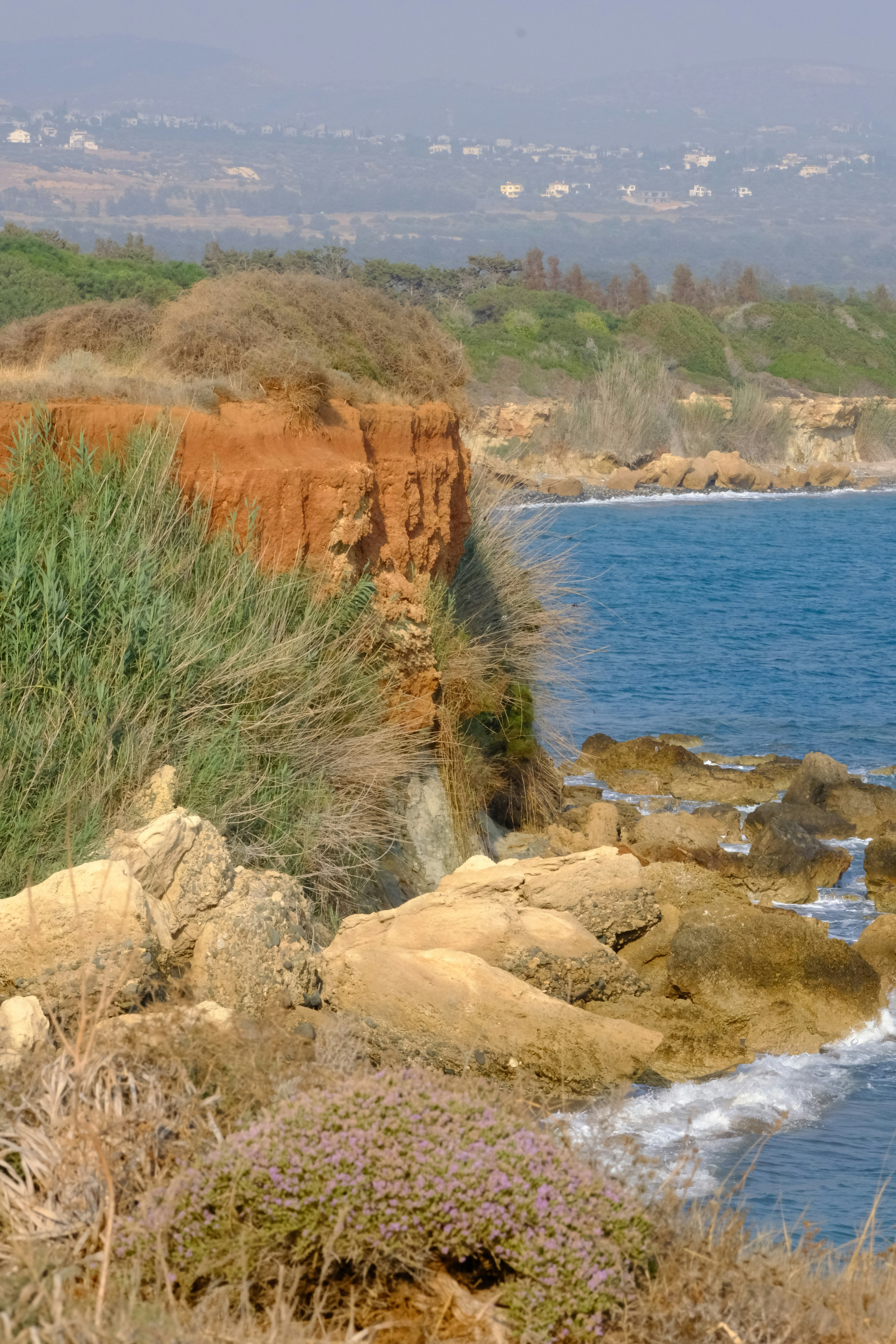 Erosion's Embrace: The Meeting of Land and Sea