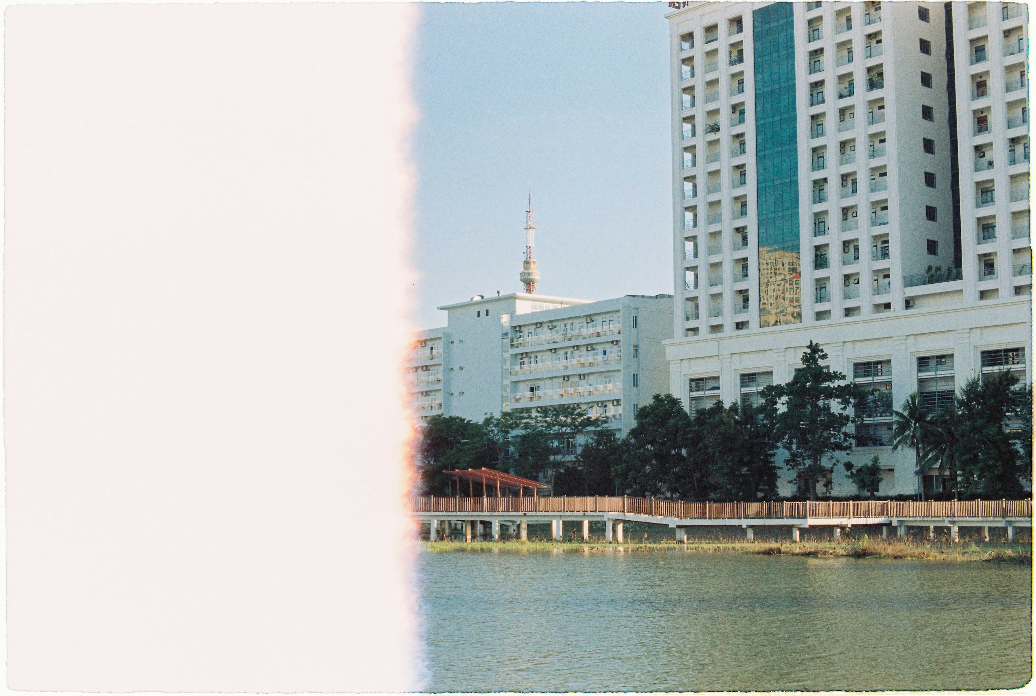 Urban Reflections: A Glimpse of Modern Life by the Water