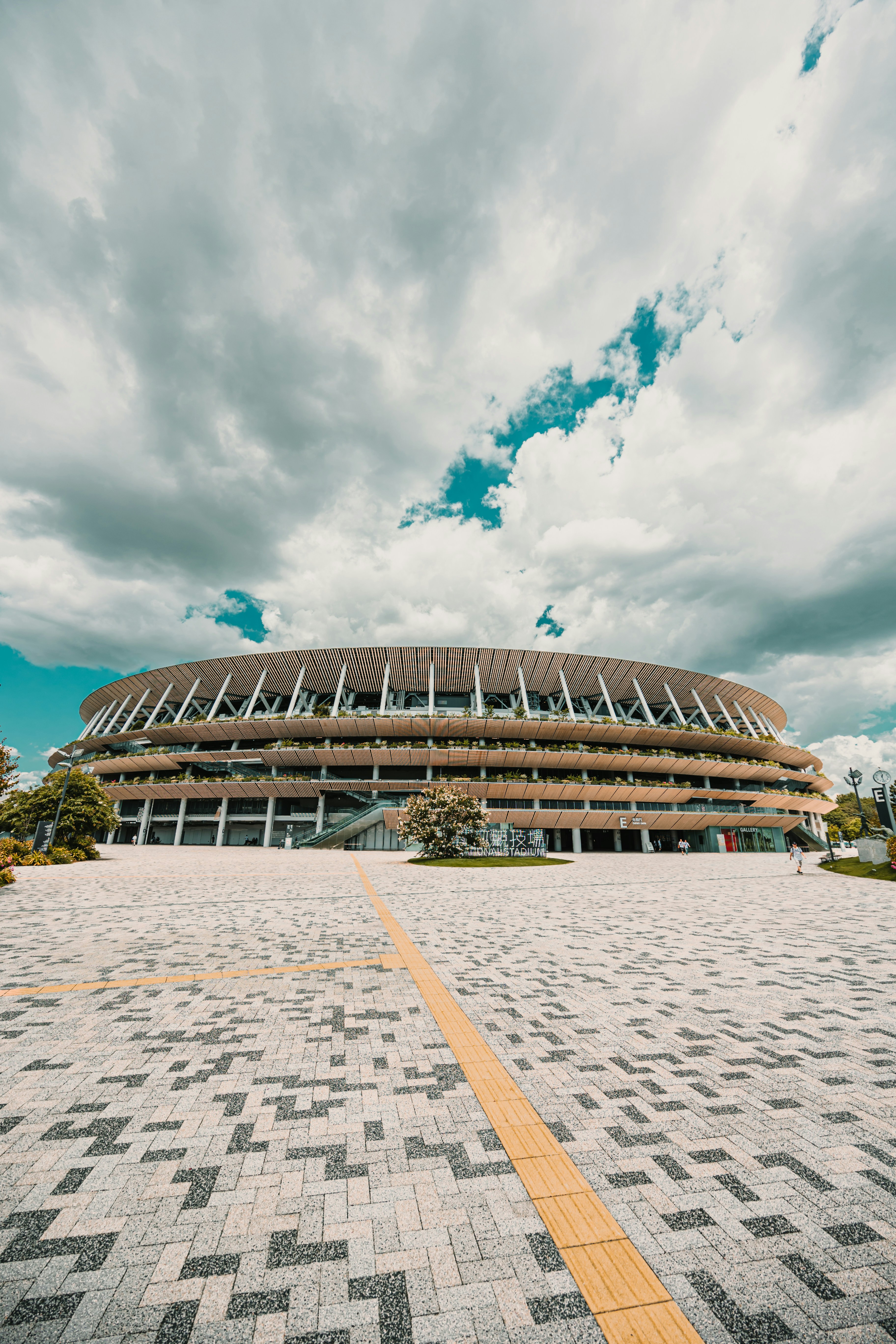Modern stadium with unique architecture under cloudy sky photo – Free ...