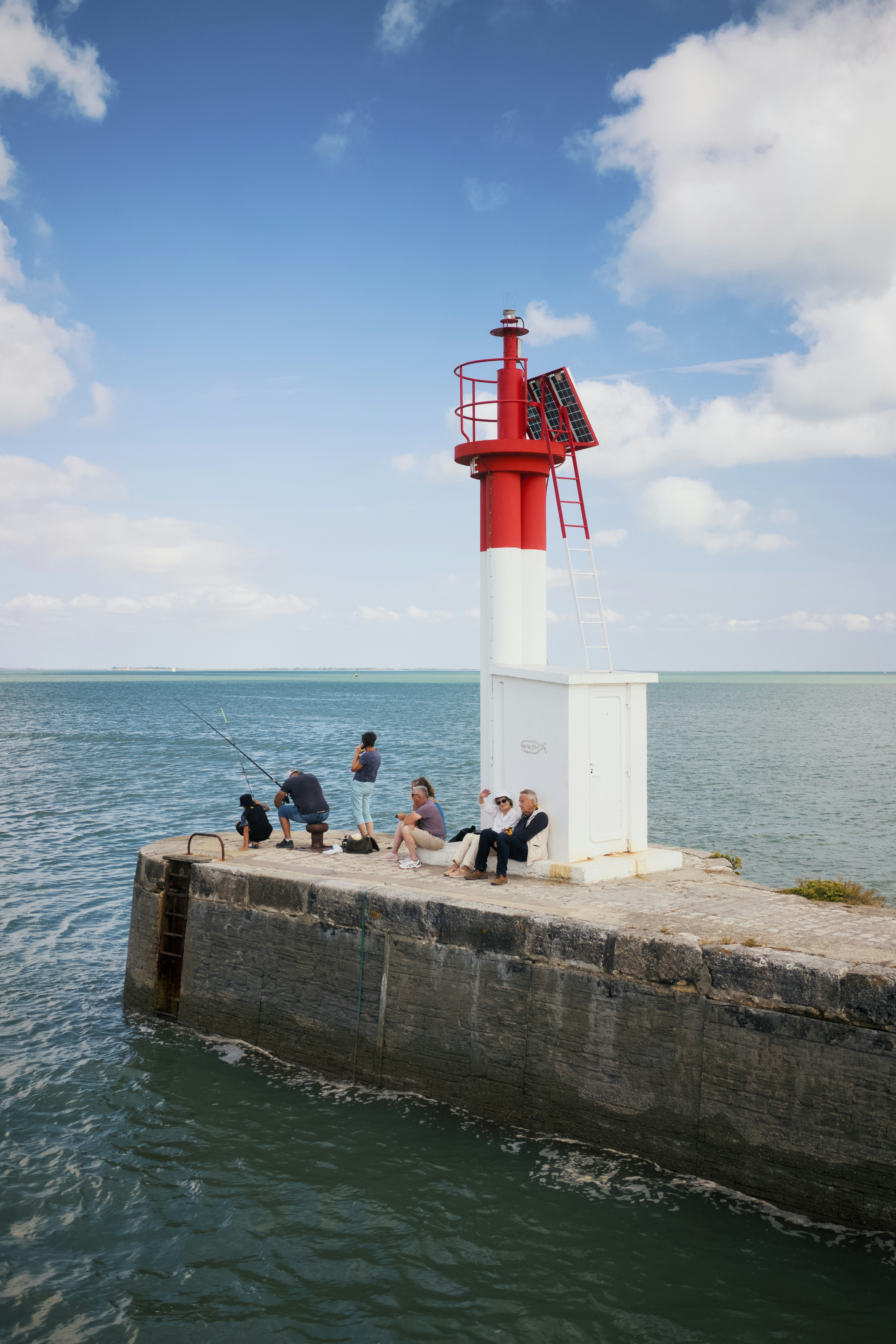Harbor Reflections: A Day by the Lighthouse