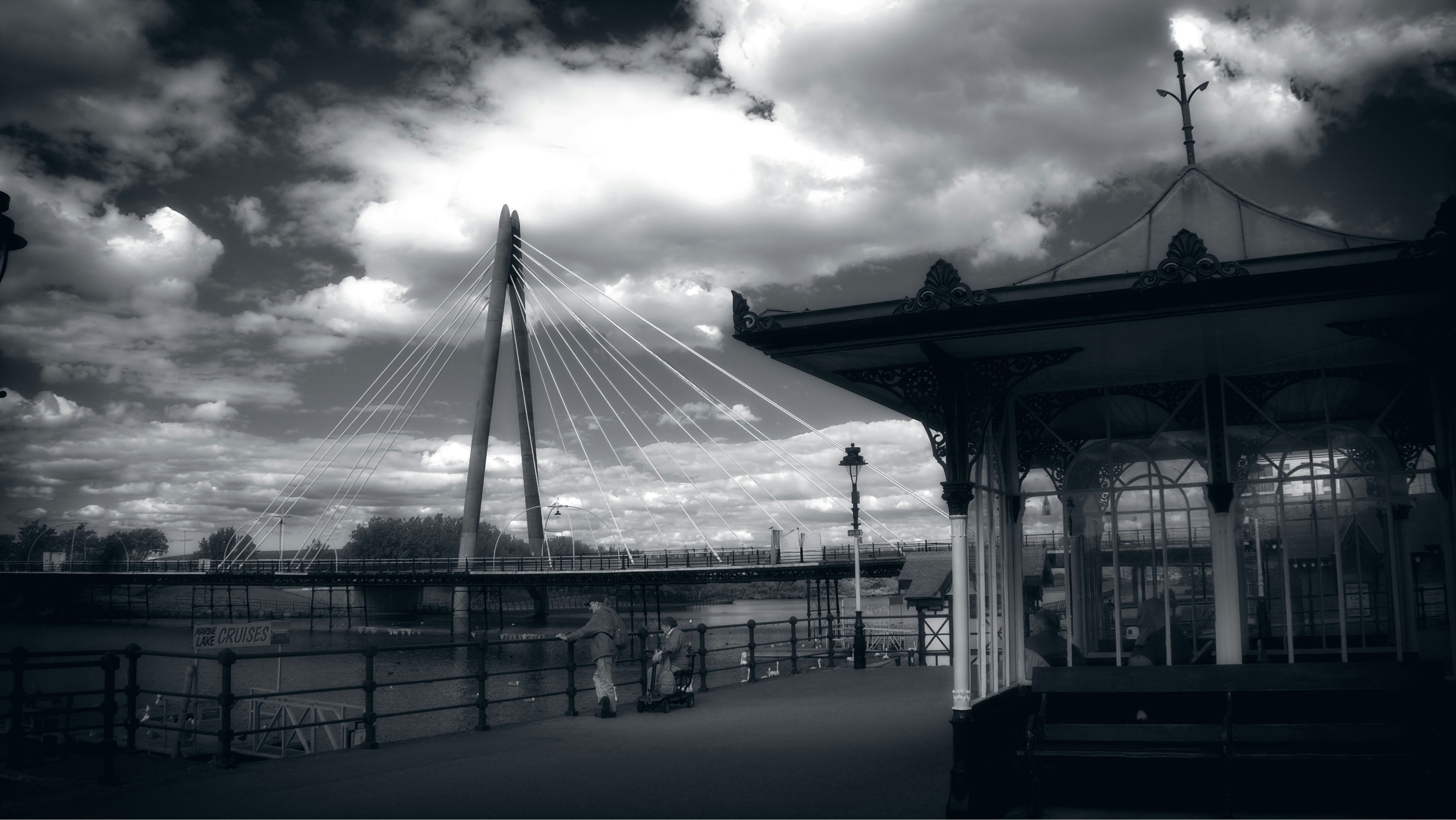 Whispers of the River: A Bridge's Solitary Elegance
