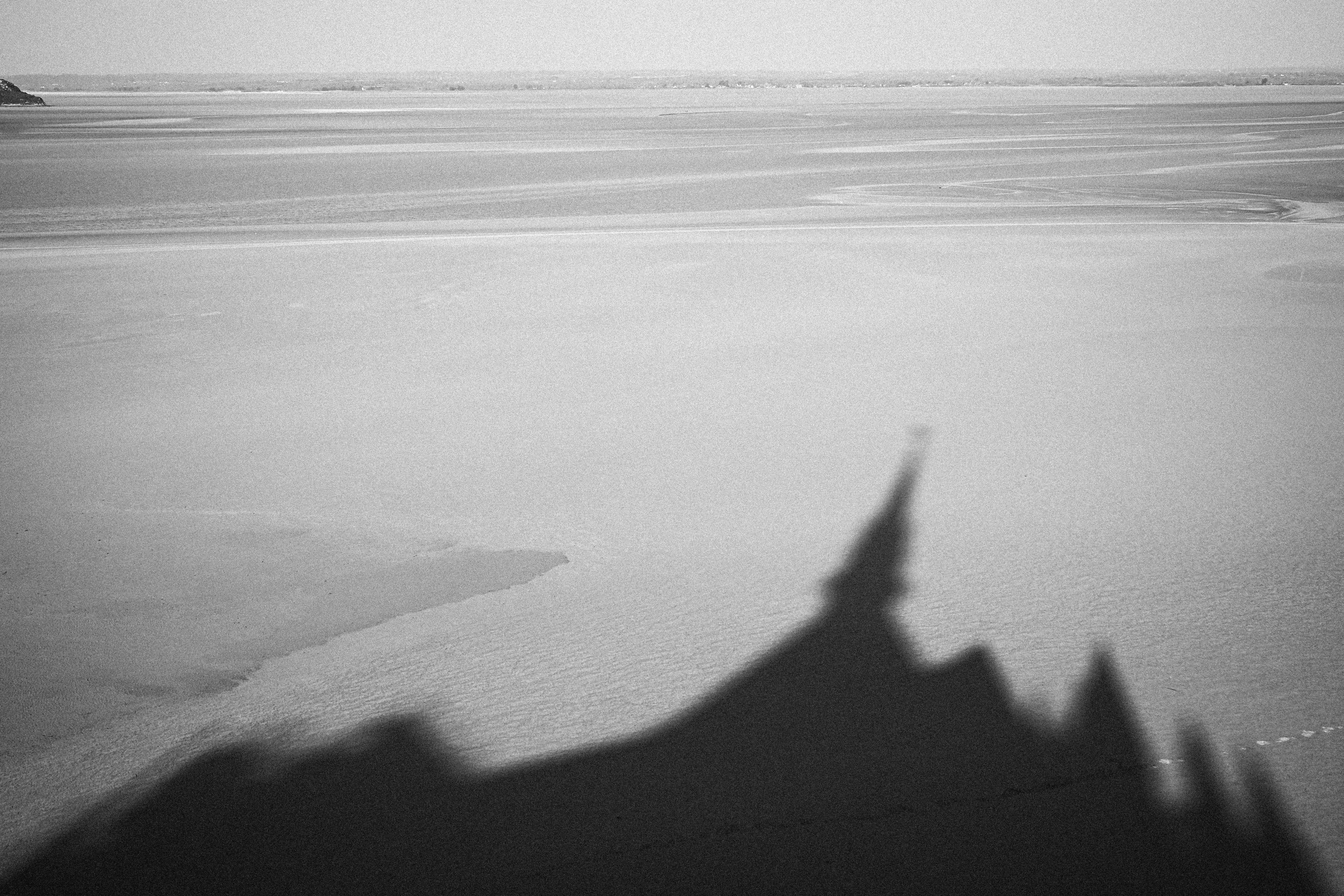 Whispers of Time: Shadows on the Tidal Flats