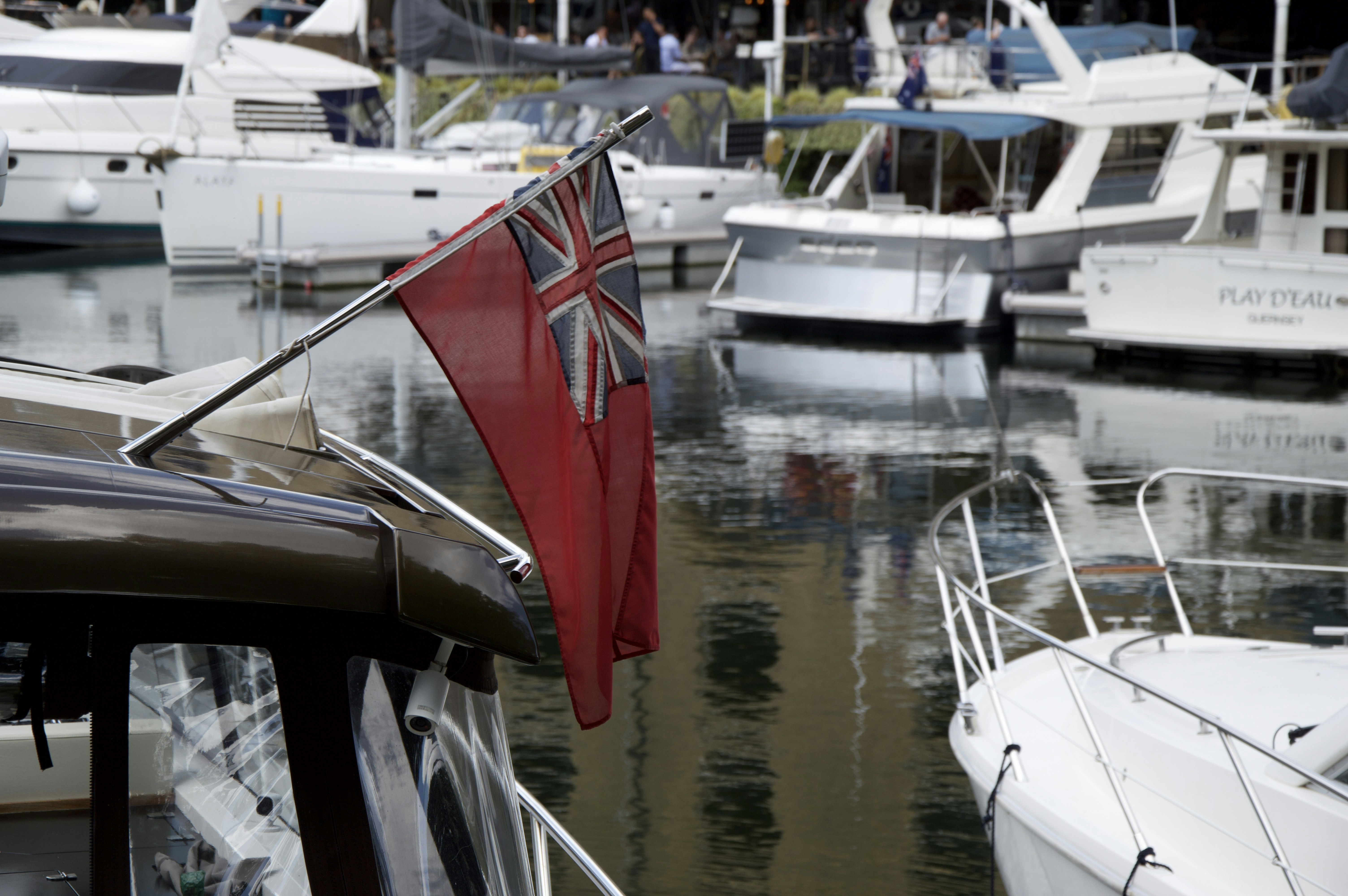 Nautical Heritage: A Flag in Tranquil Waters