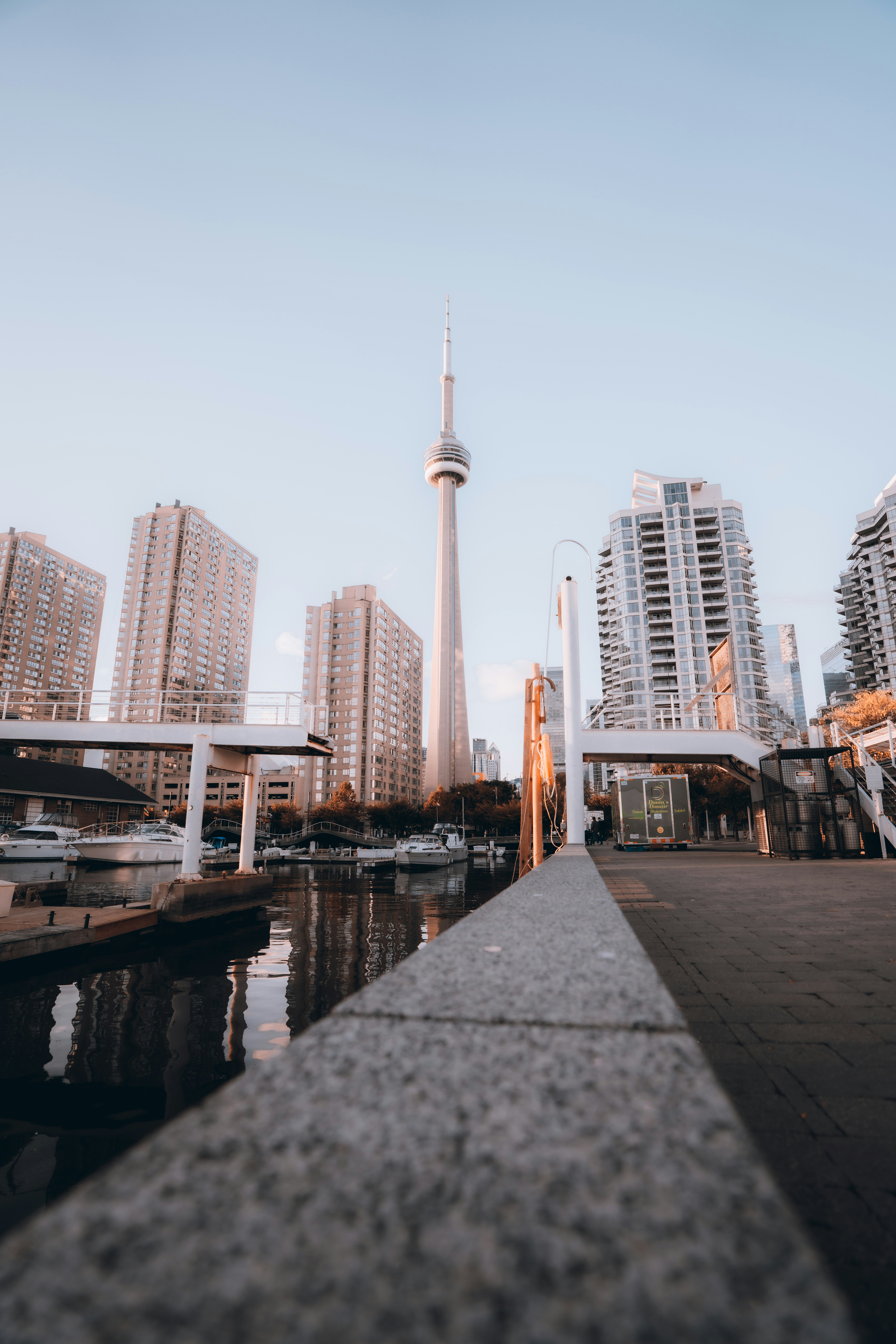 Urban Reflections: The CN Tower's Vertical Symphony