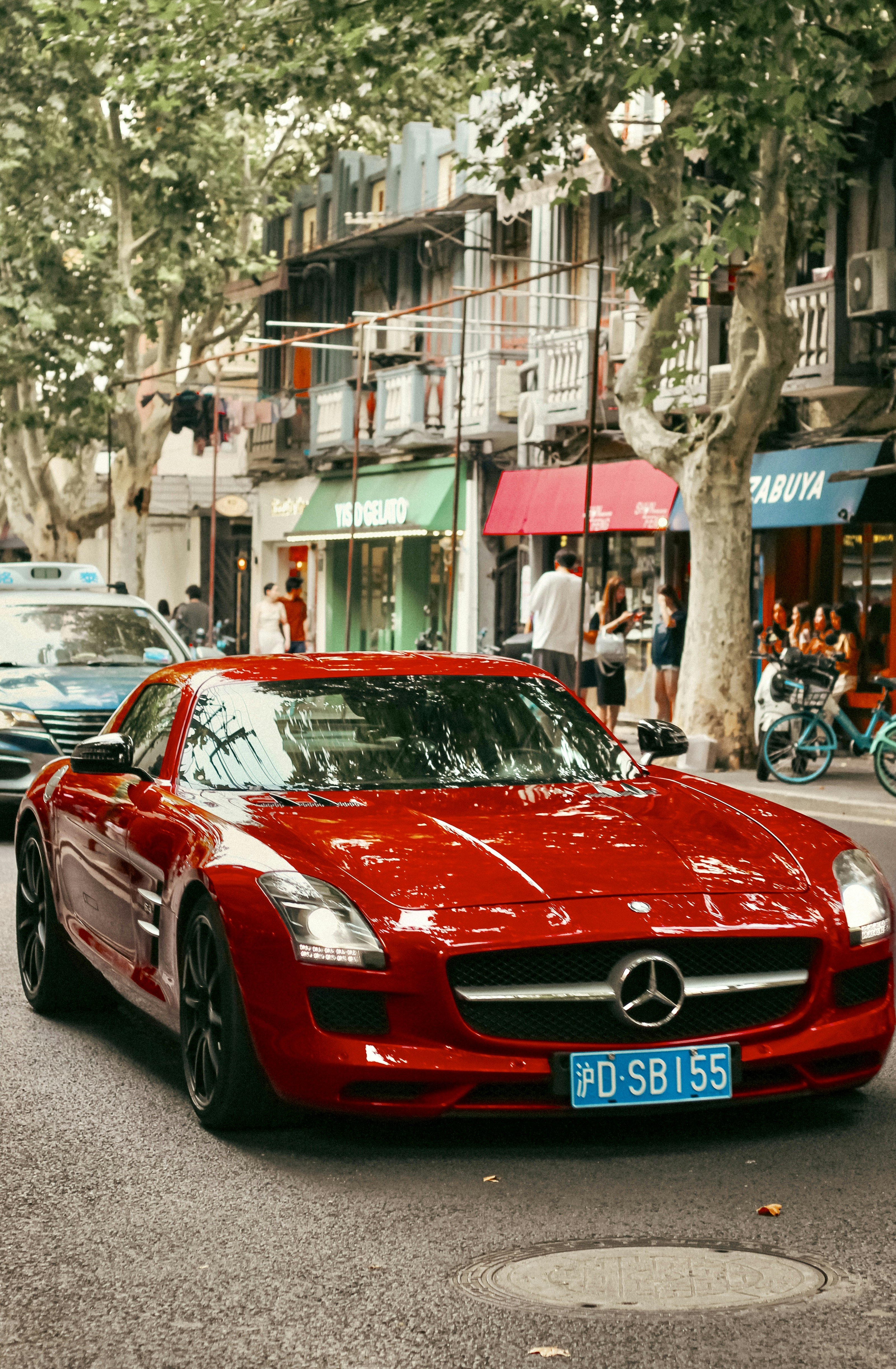 Urban Elegance: The Red Marvel on City Streets