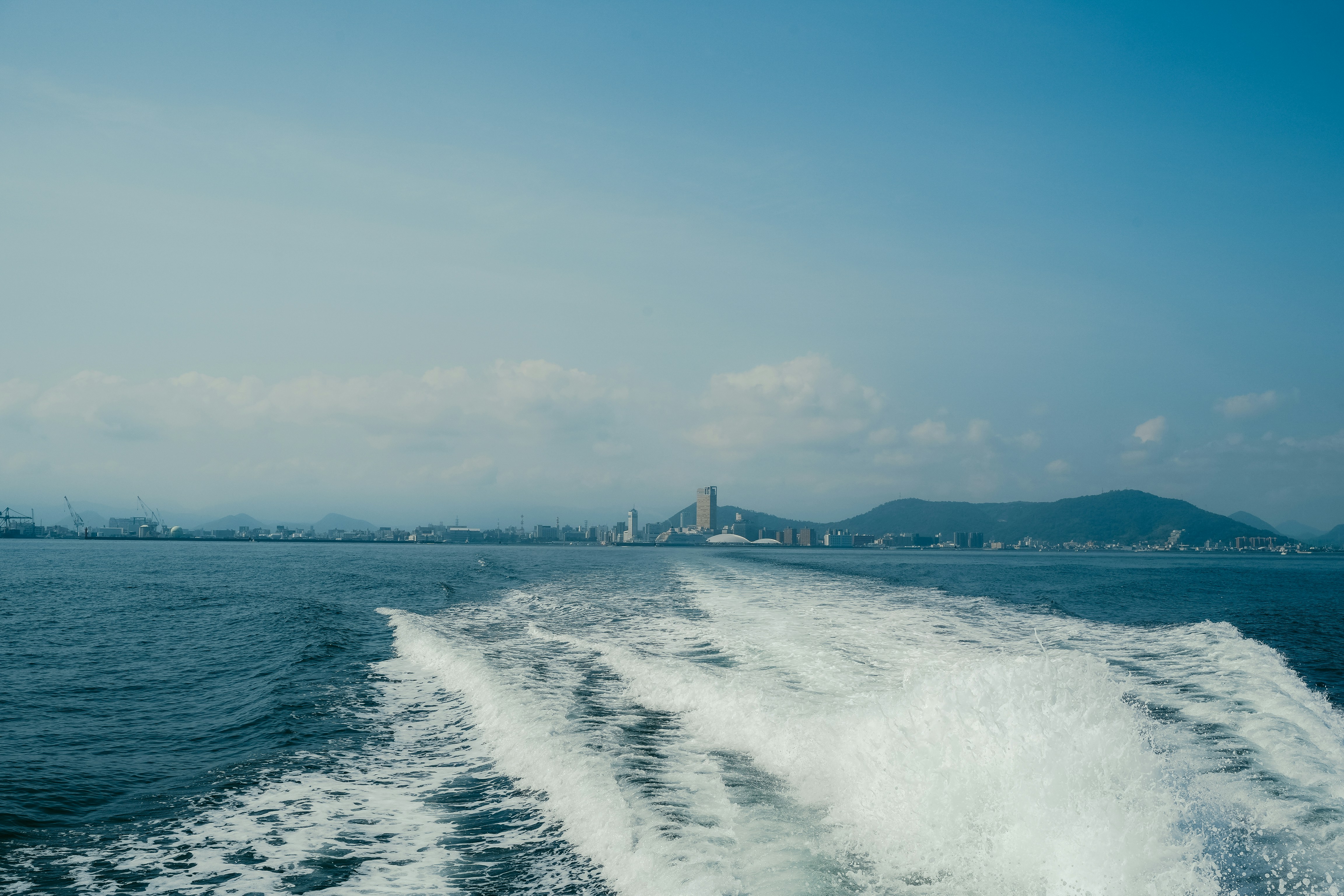 Wake Toward the City Horizon
