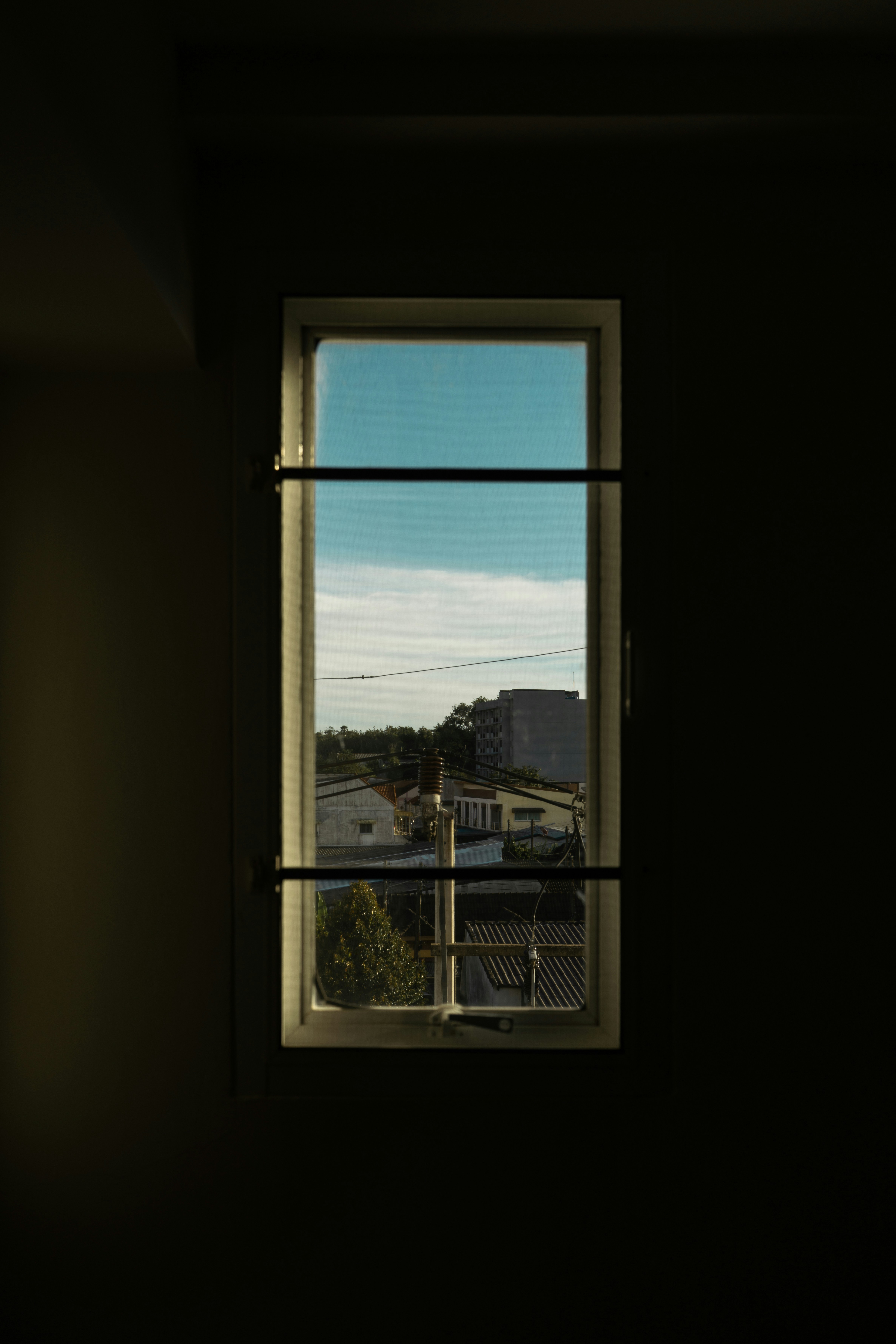 Framed Serenity: A Glimpse Beyond the Glass