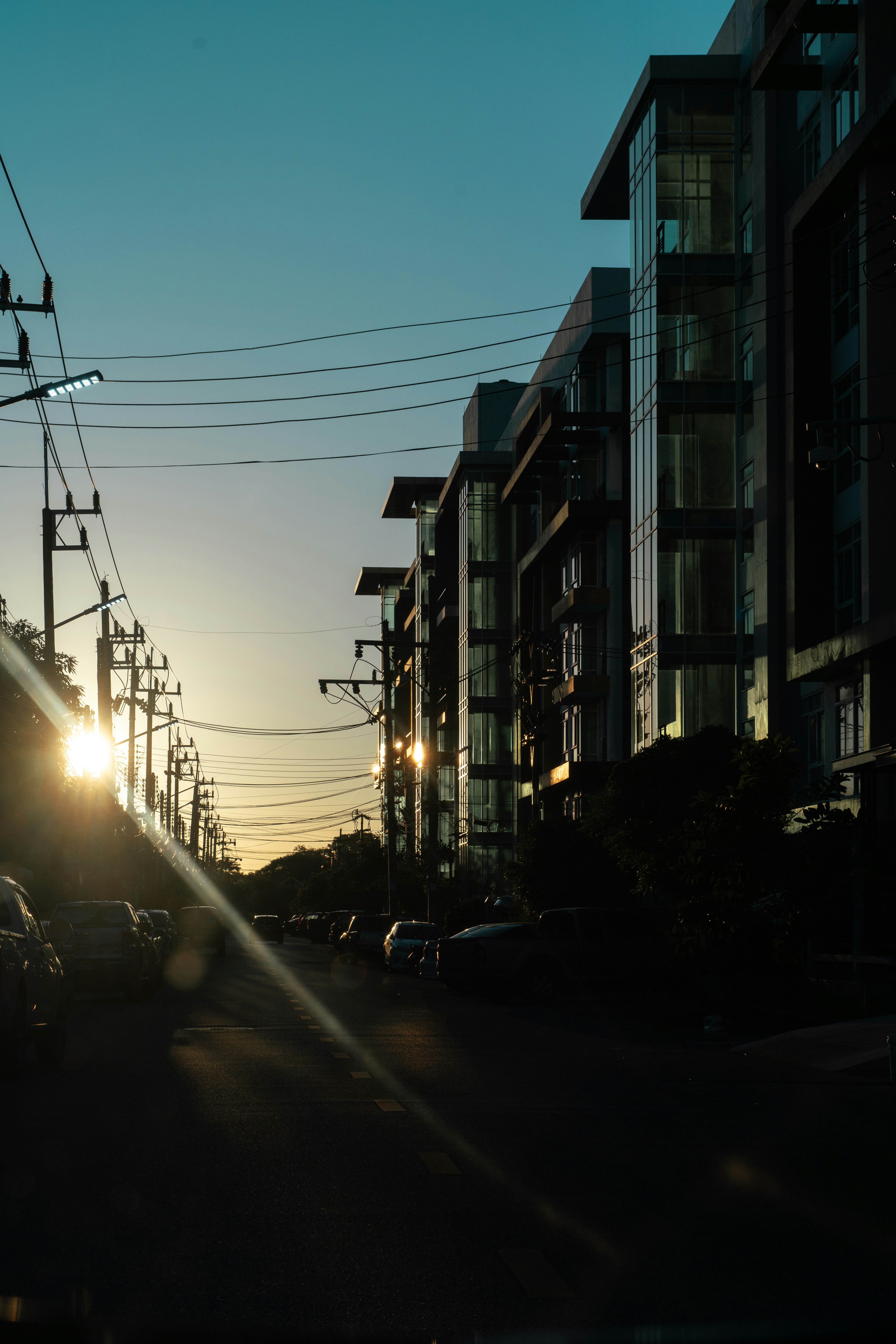Sunburst at the Edge: Sunset Street in Glass and Steel