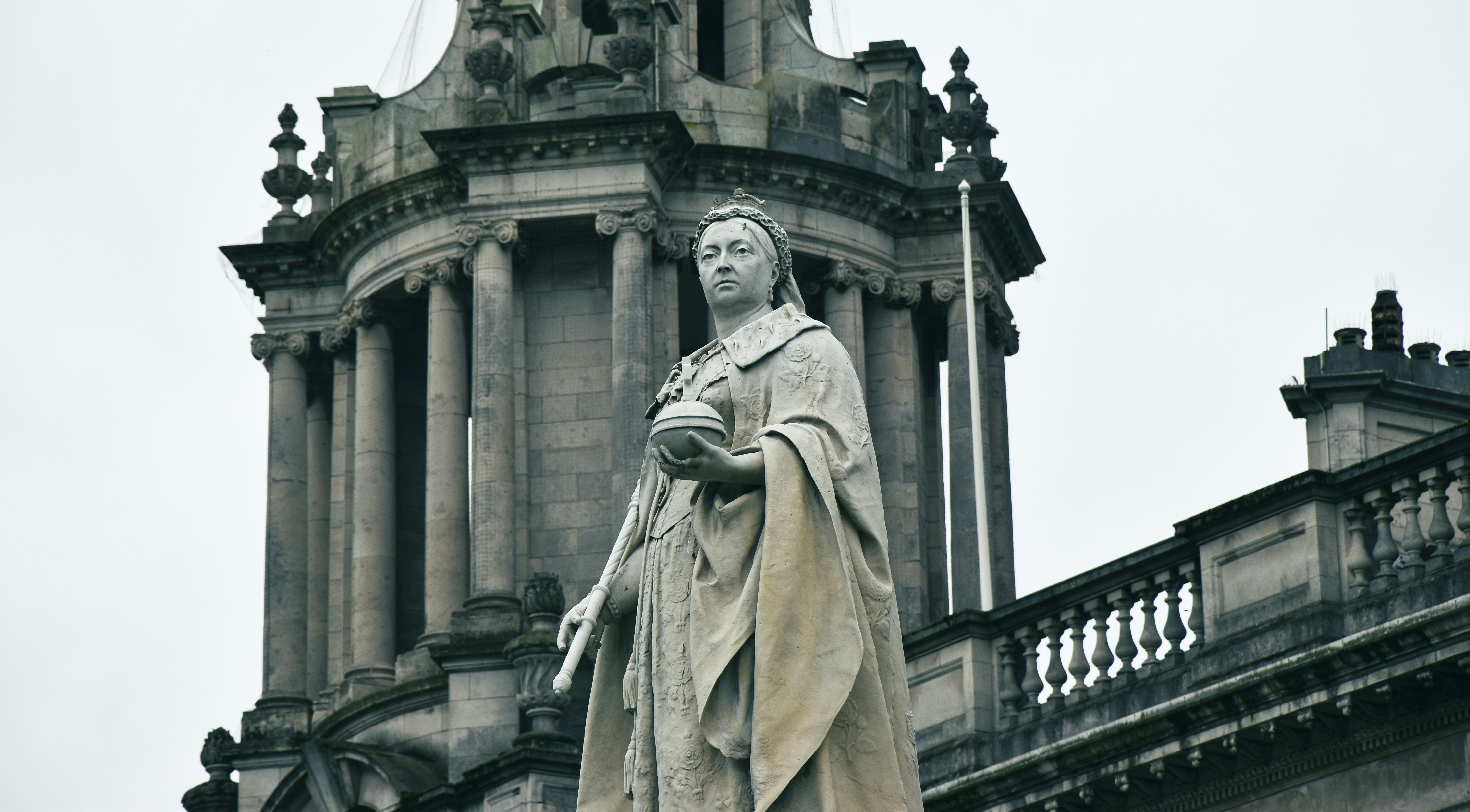 Marble Sentinel Framed by a Baroque Facade