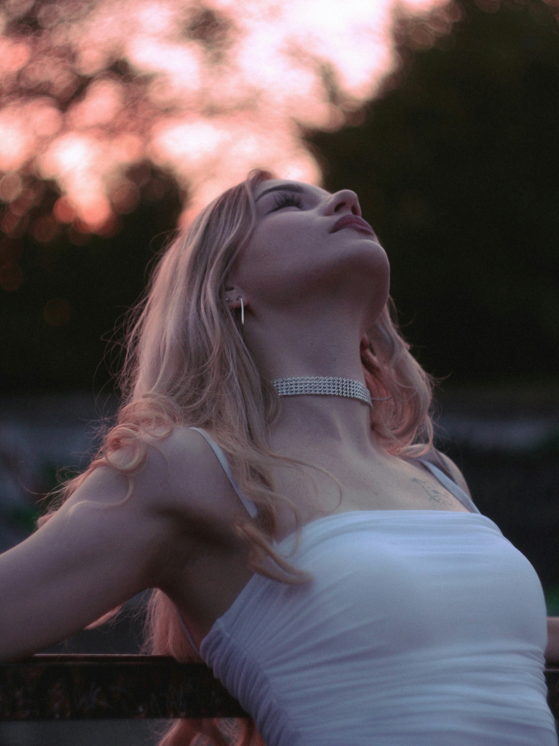 Dusk-Glow Portrait: A White Dress Beneath Pink Twilight