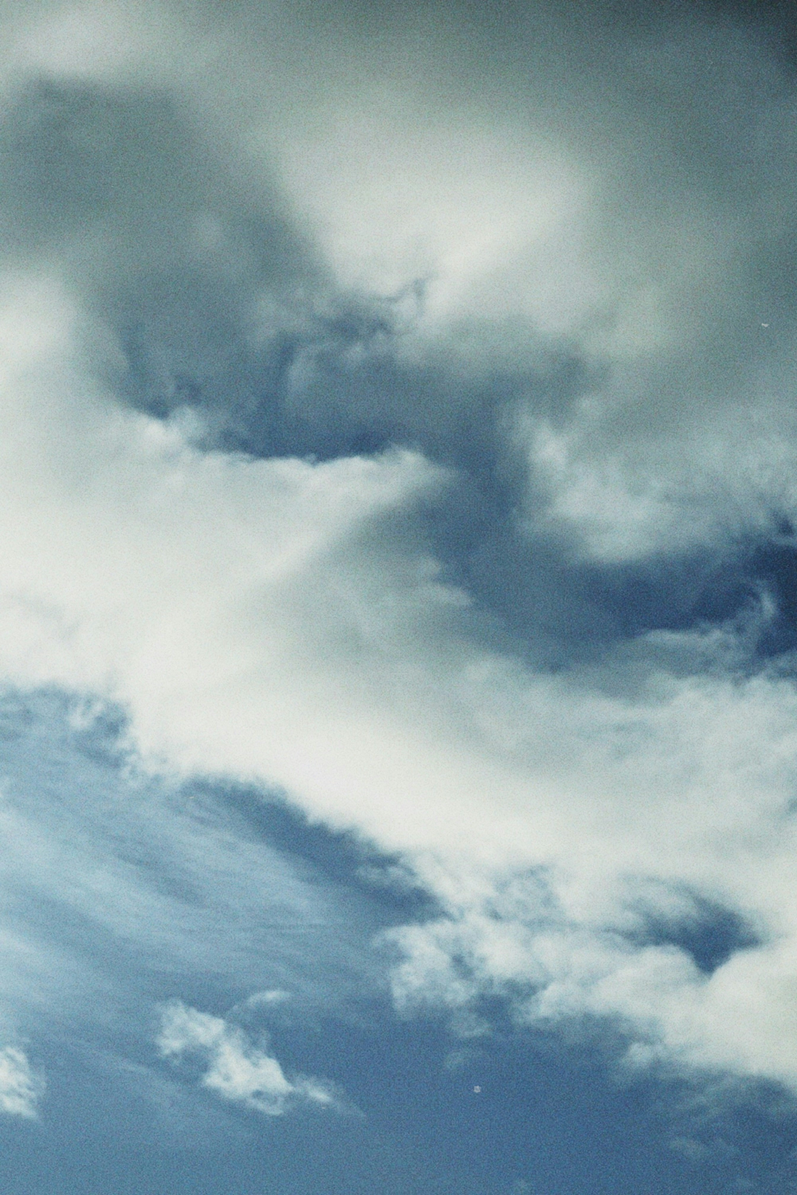 Clouds in sky | Dramatic clouds drift across a blue sky.