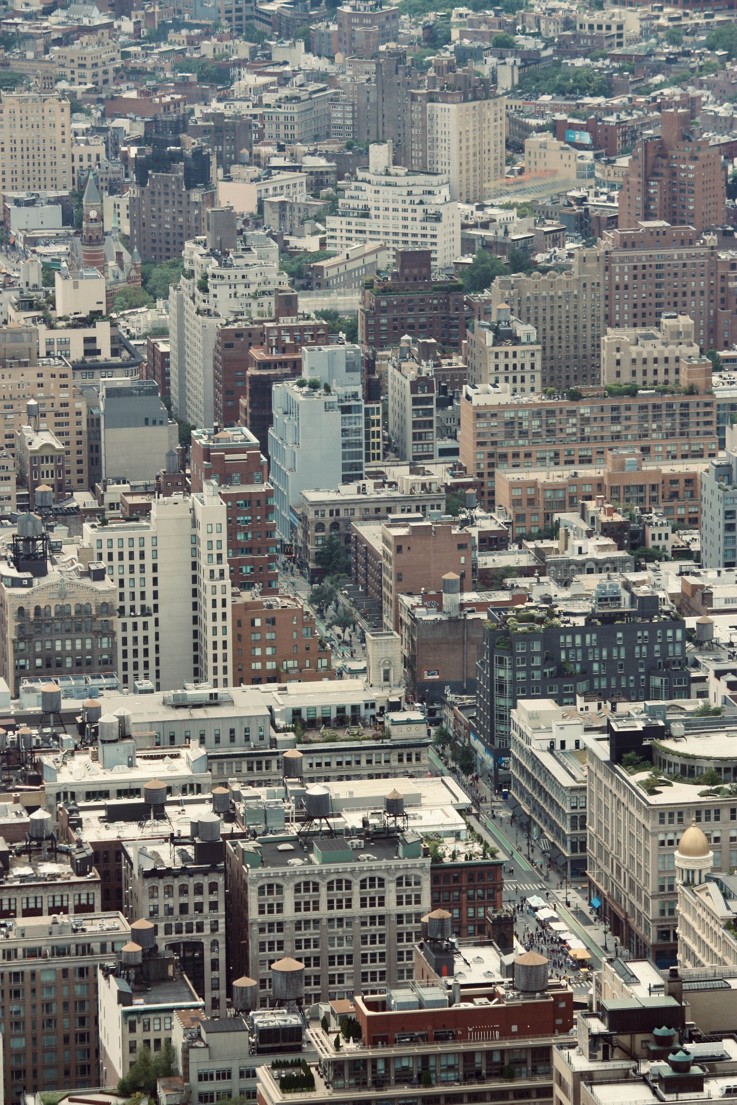 Aerial view of a dense city skyline with many buildings.