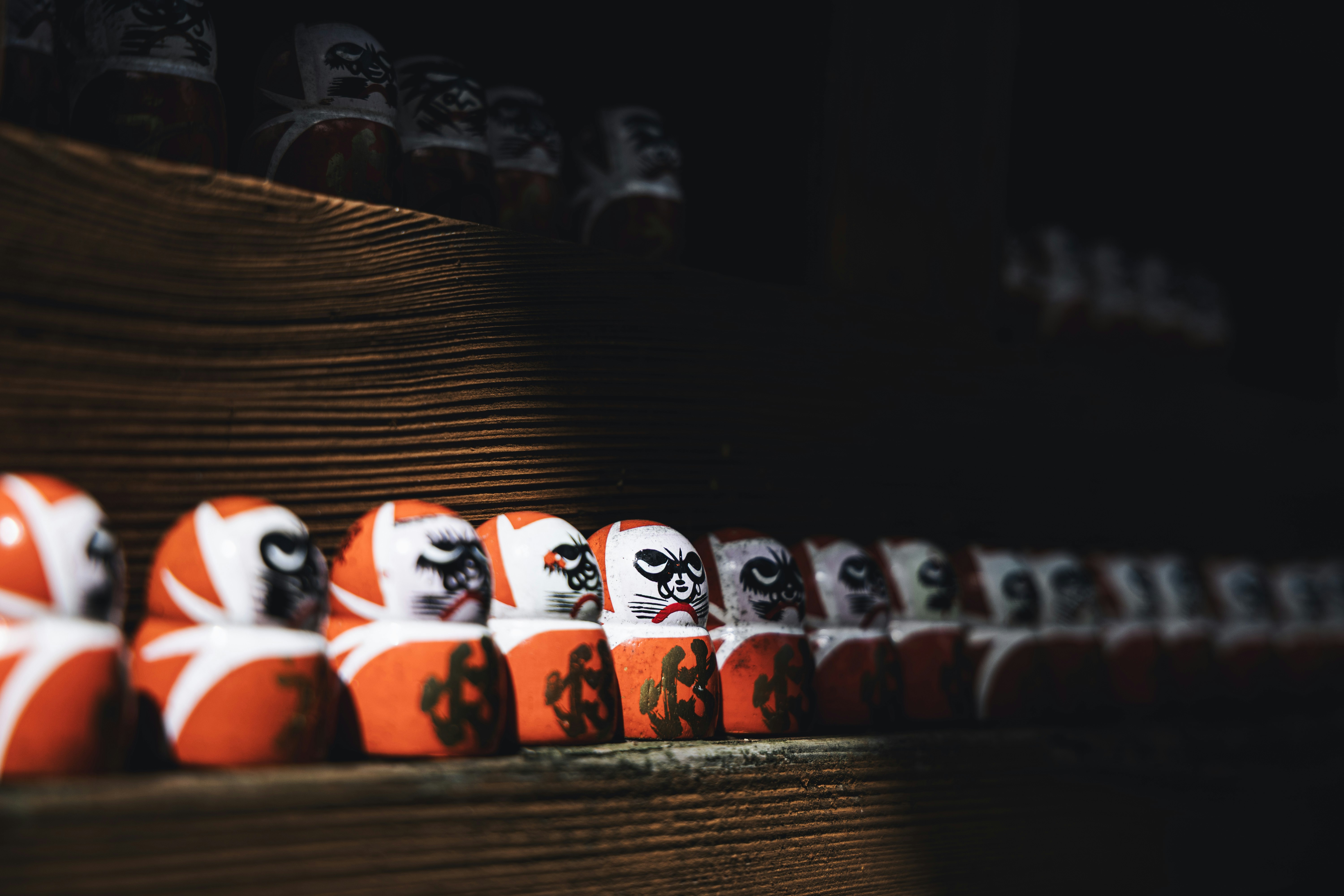 Whispers of Tradition: The Daruma Dolls' Silent Vigil