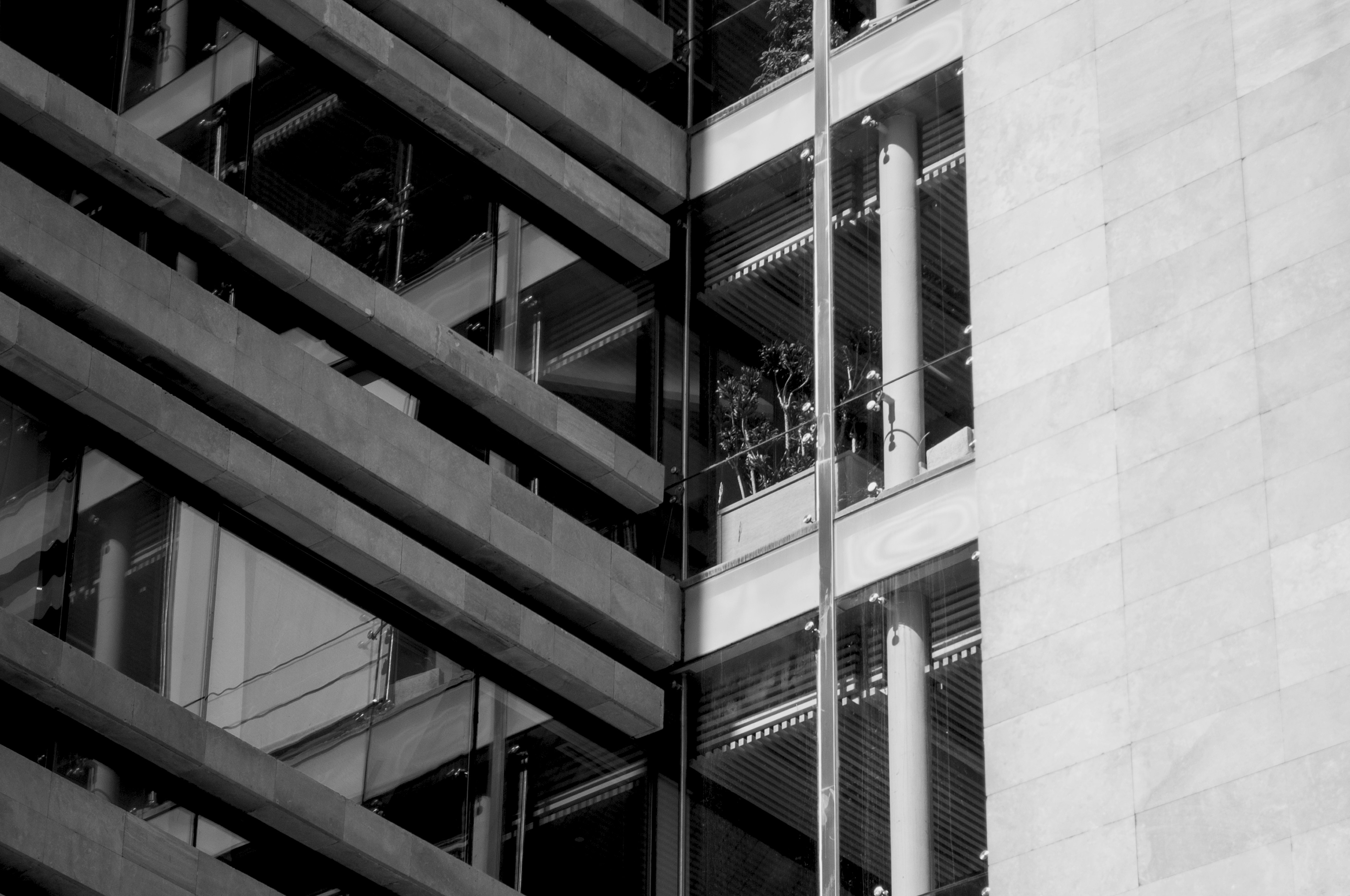 Modern building facade with geometric patterns and windows