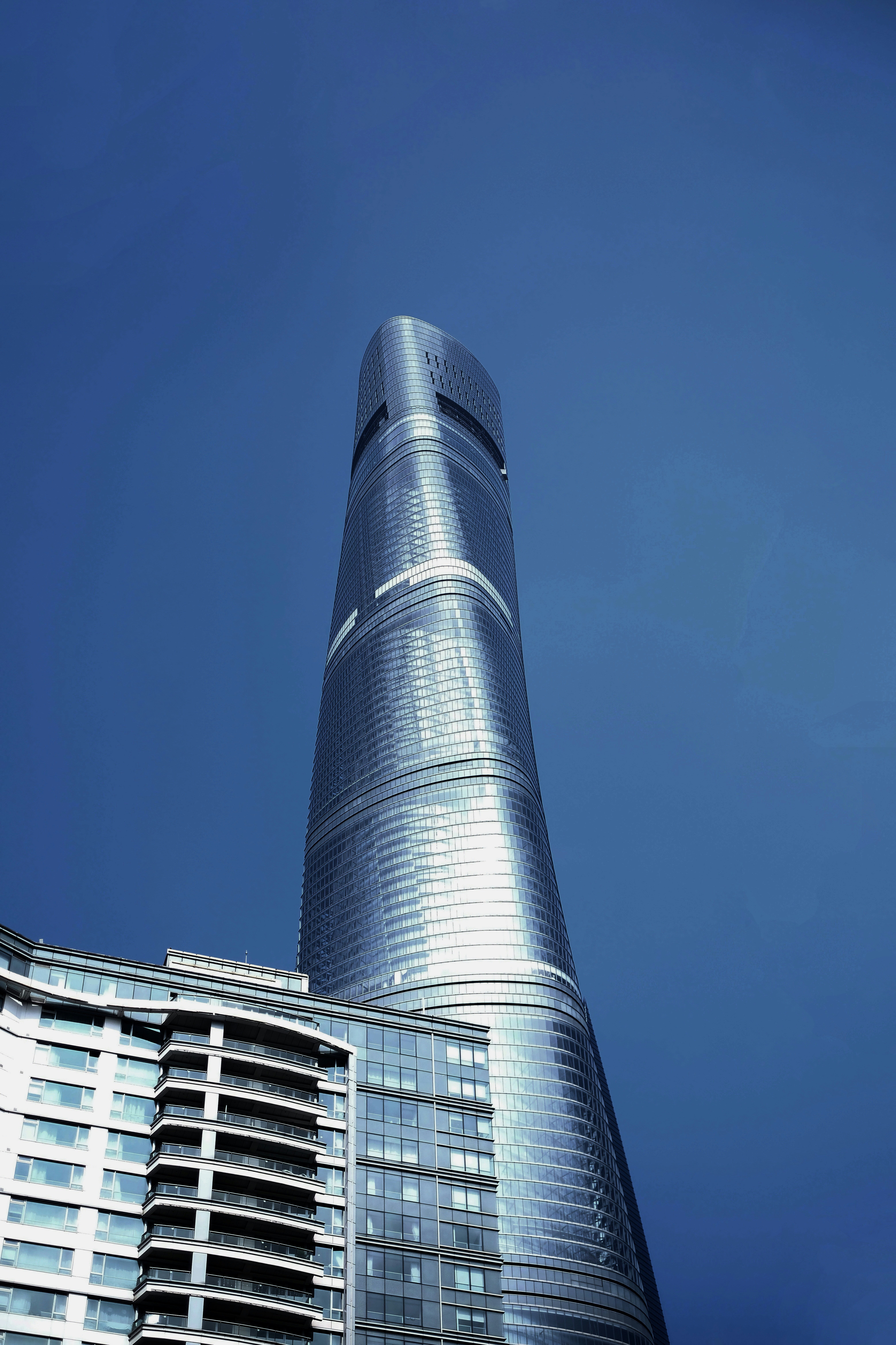 Modern skyscraper against a clear blue sky