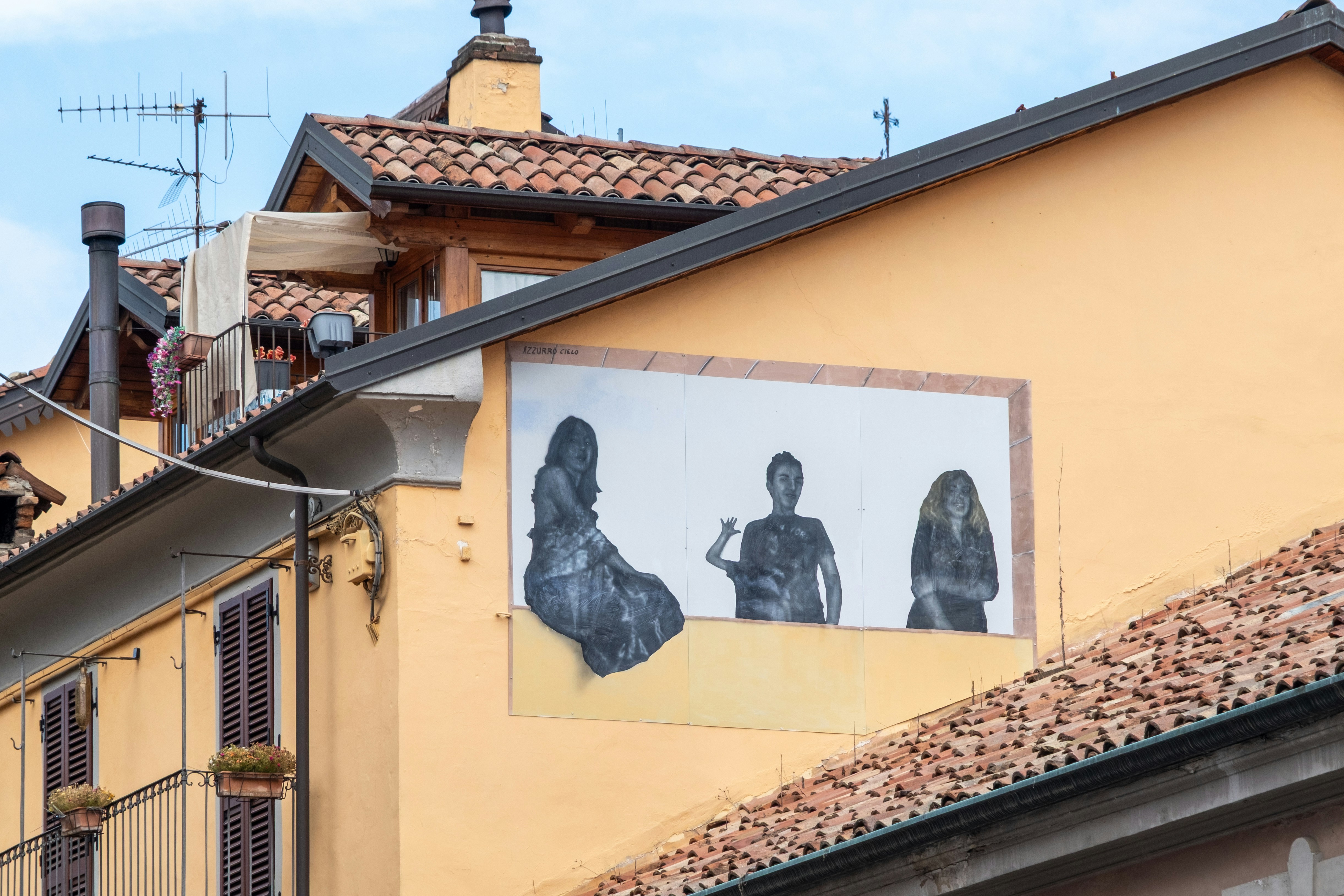 Silent Conversations: Shadows on a Yellow Canvas