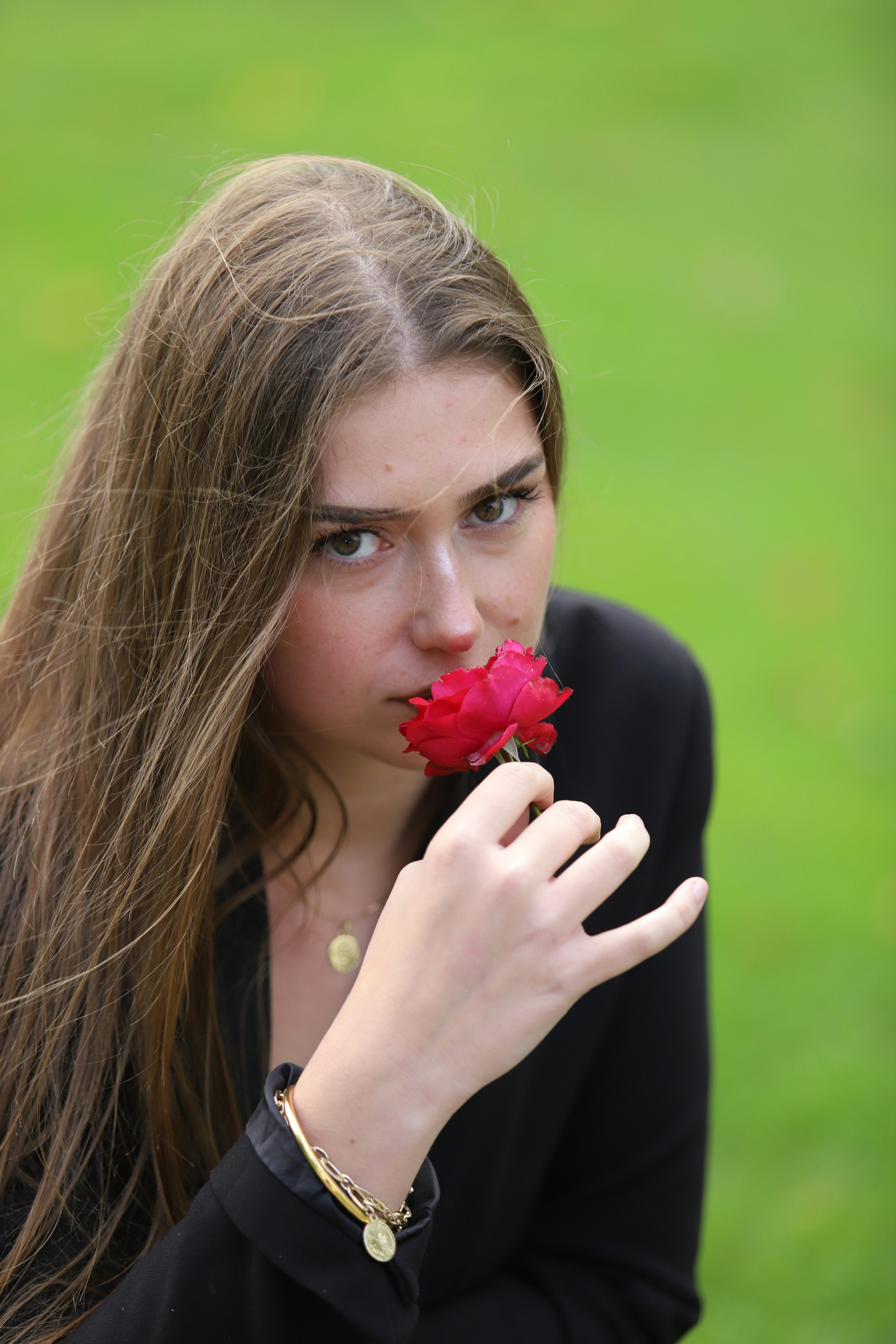 Whispers of Nature: A Moment with a Rose