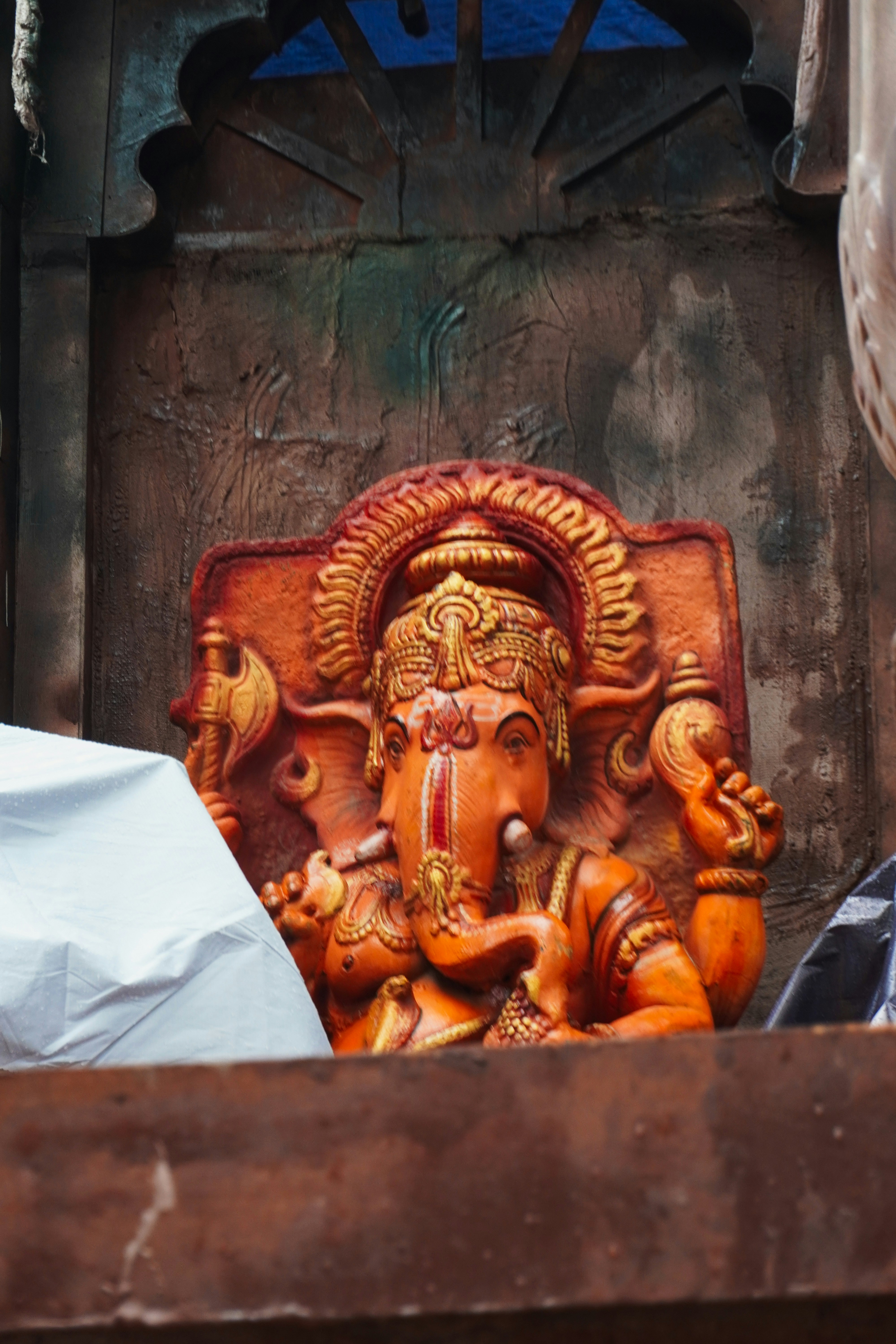 Terracotta Ganesha in a Weathered Shrine