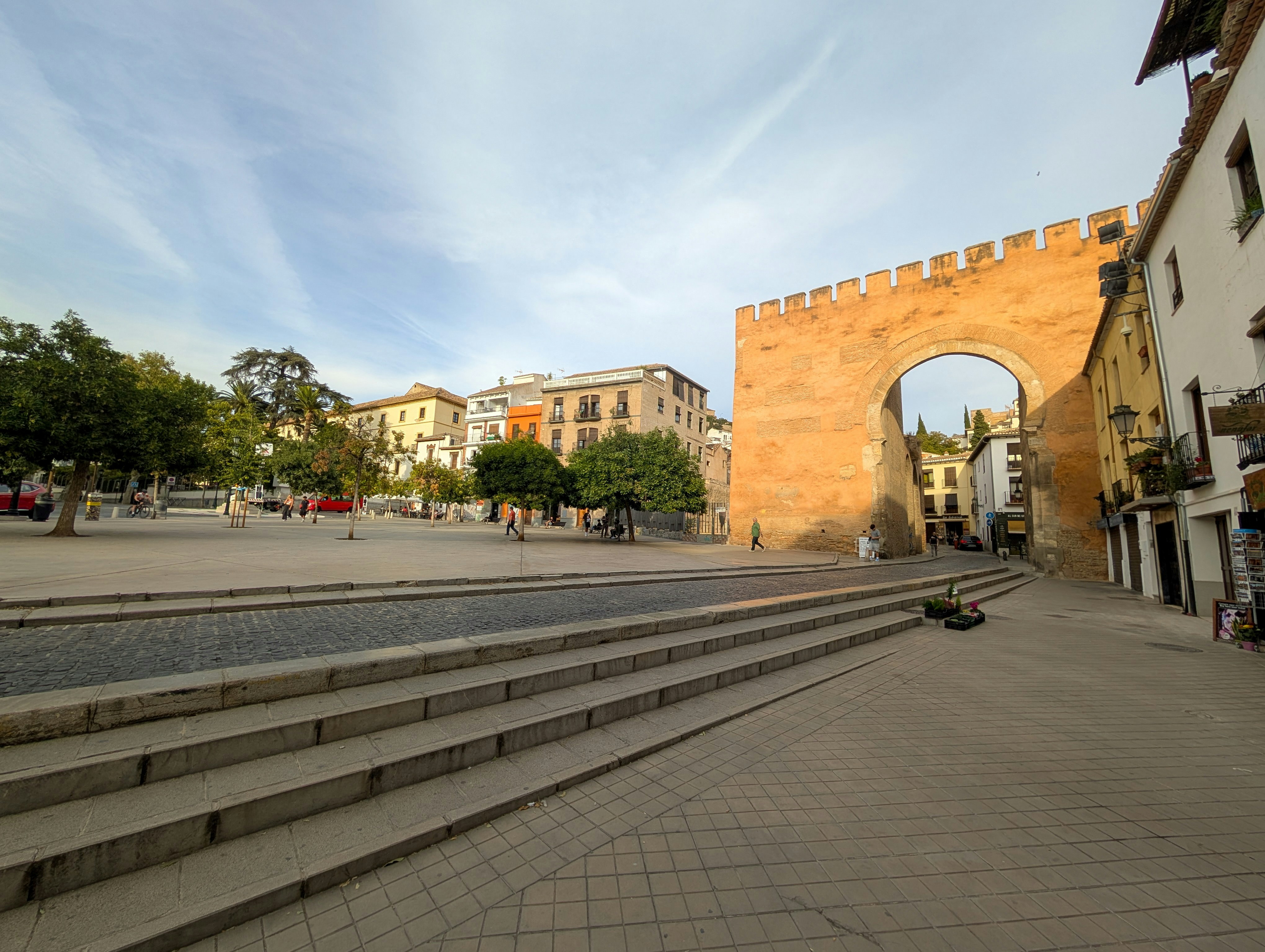 Arched gateway in a historic town square
