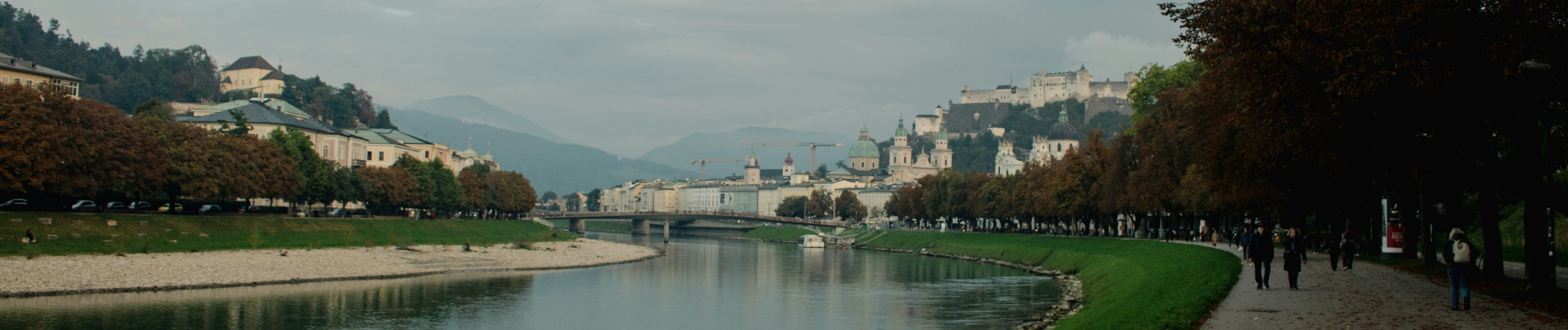 Echoes of History: A Serene Riverfront in Salzburg