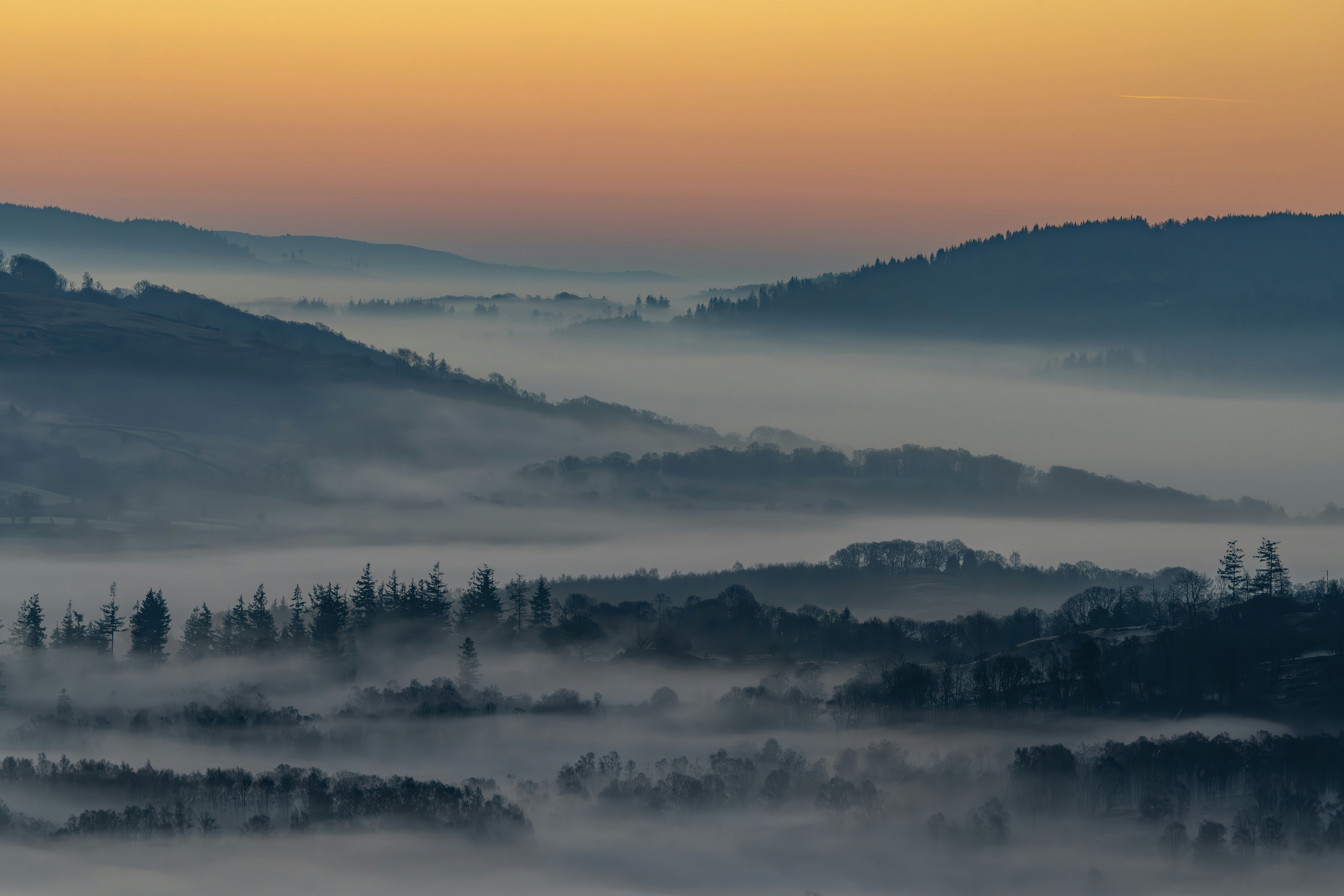 Whispers of Dawn Over Misty Valleys