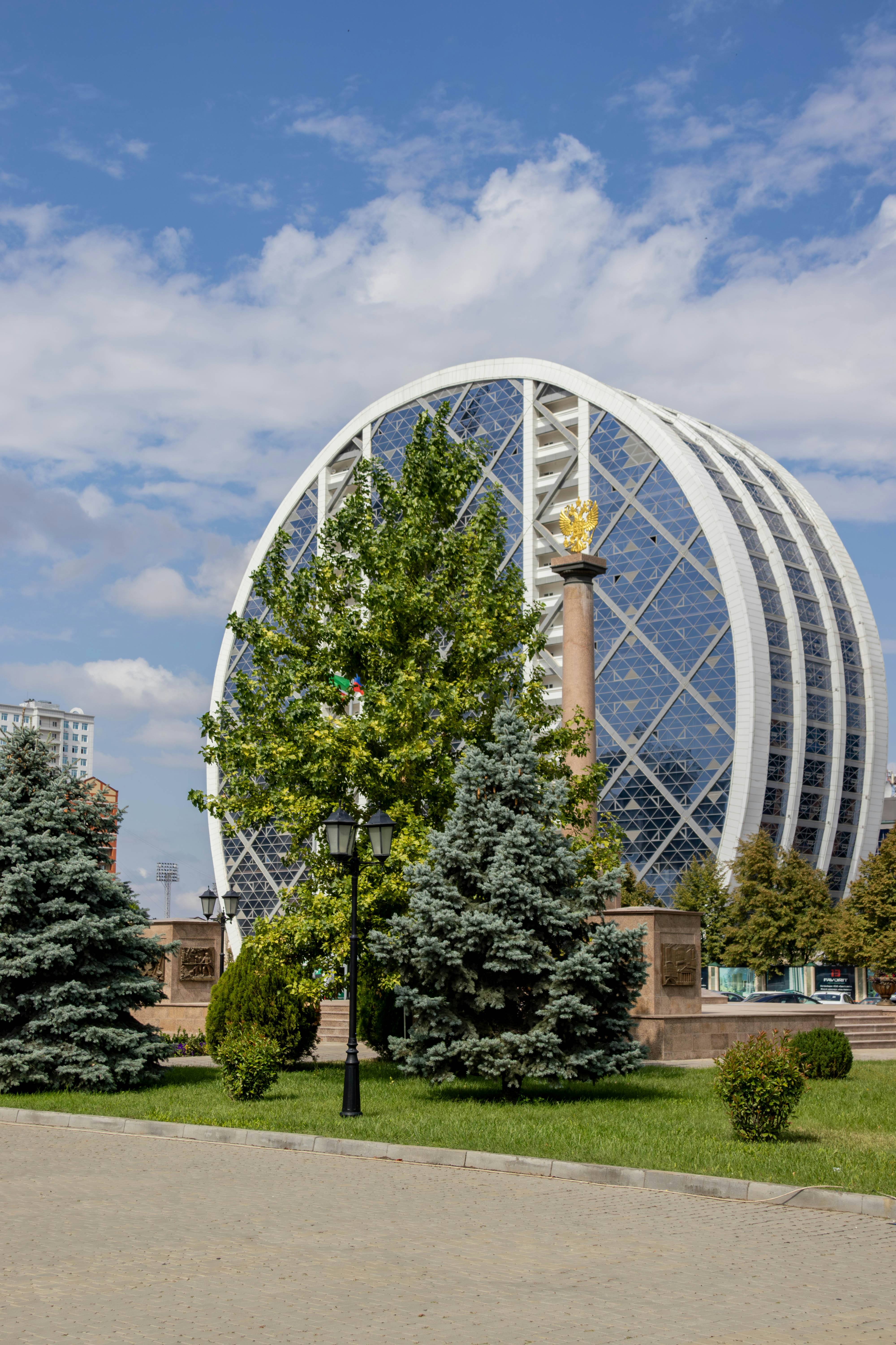 Gold-Topped Monument Framing a Diamond-Grid Glass Dome