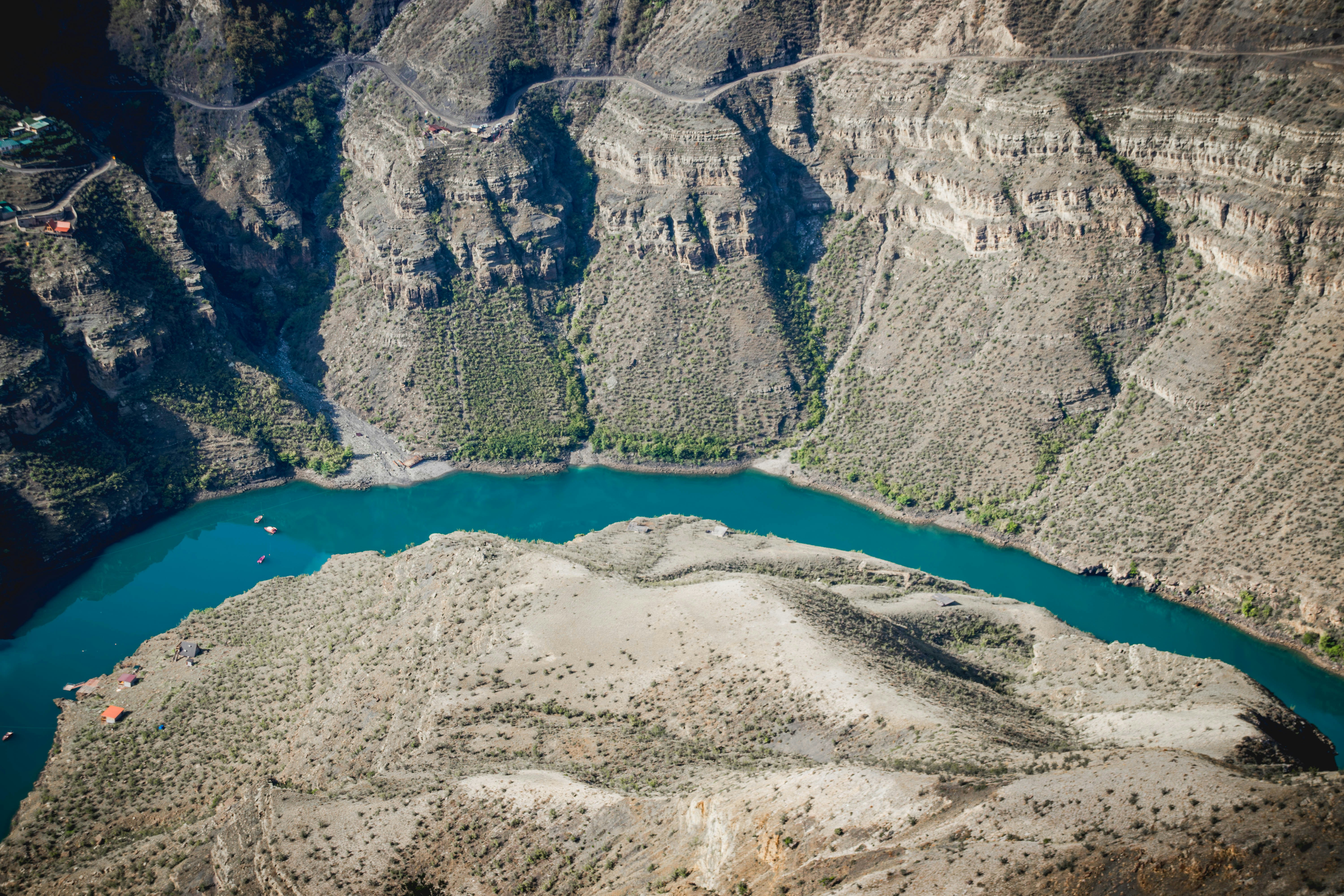 Sulak canyon | Aerial view of a turquoise river winding through a canyon