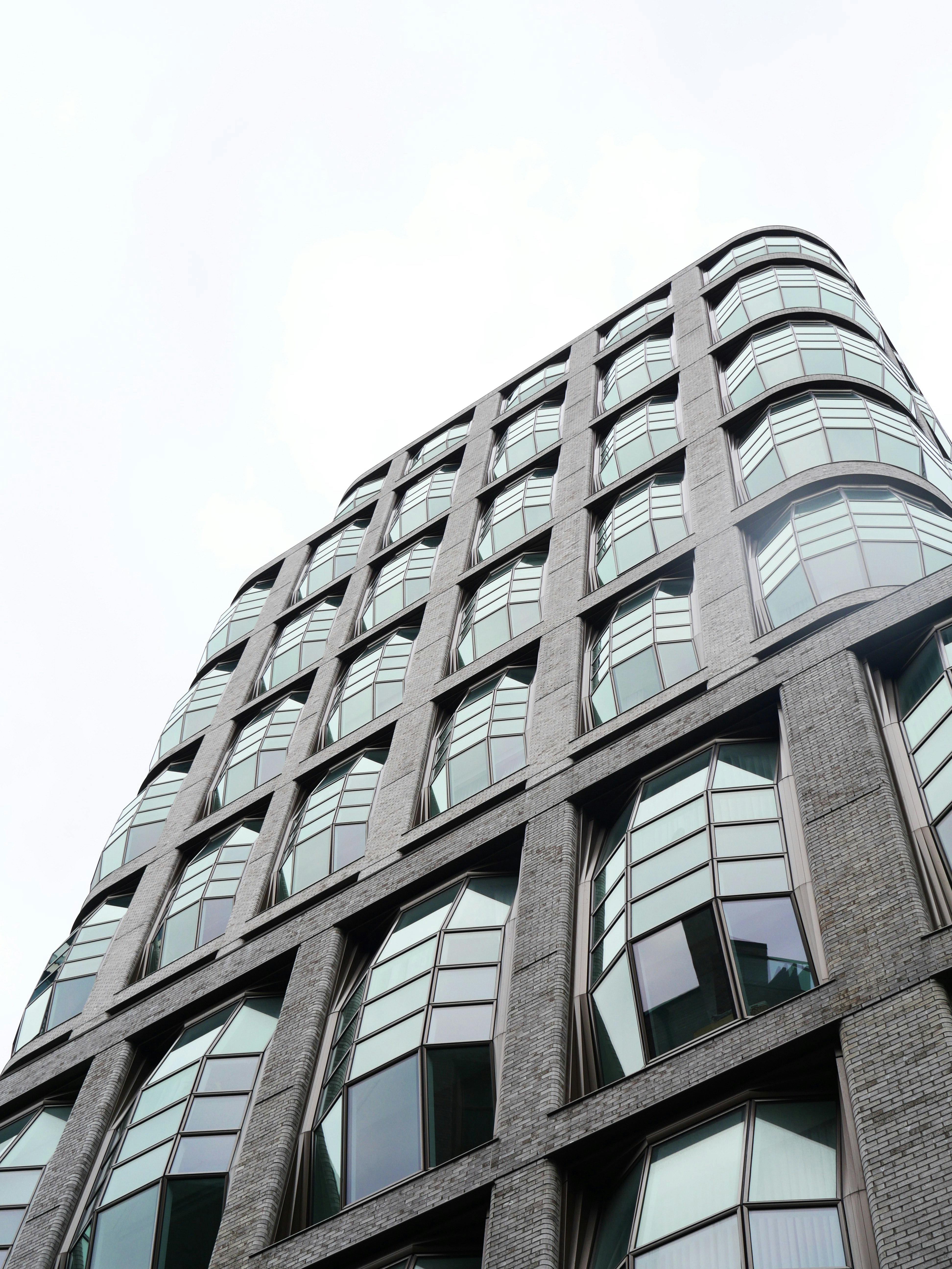 Modern building with curved windows against sky
