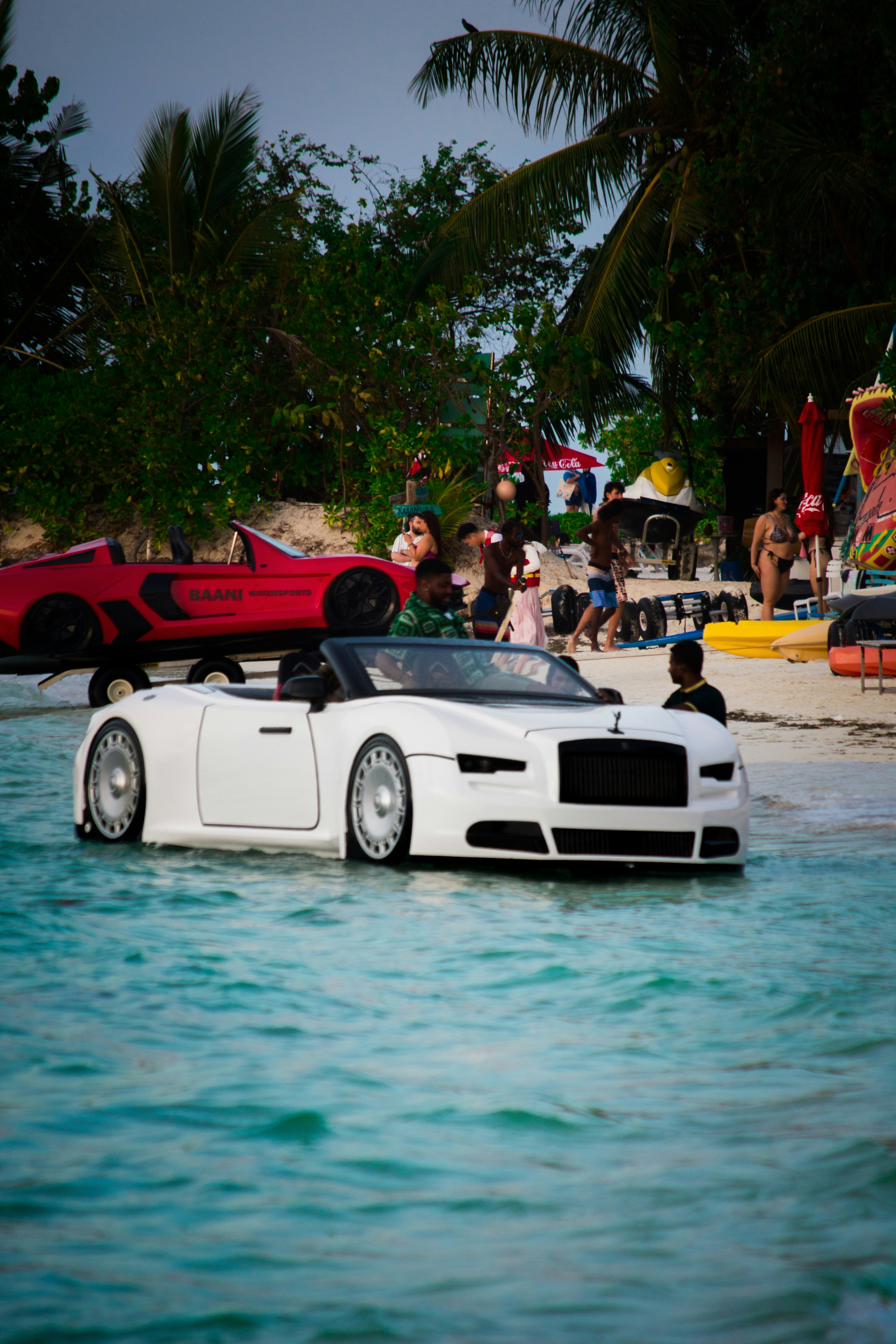 Aquatic Elegance: A Beachside Car Showdown