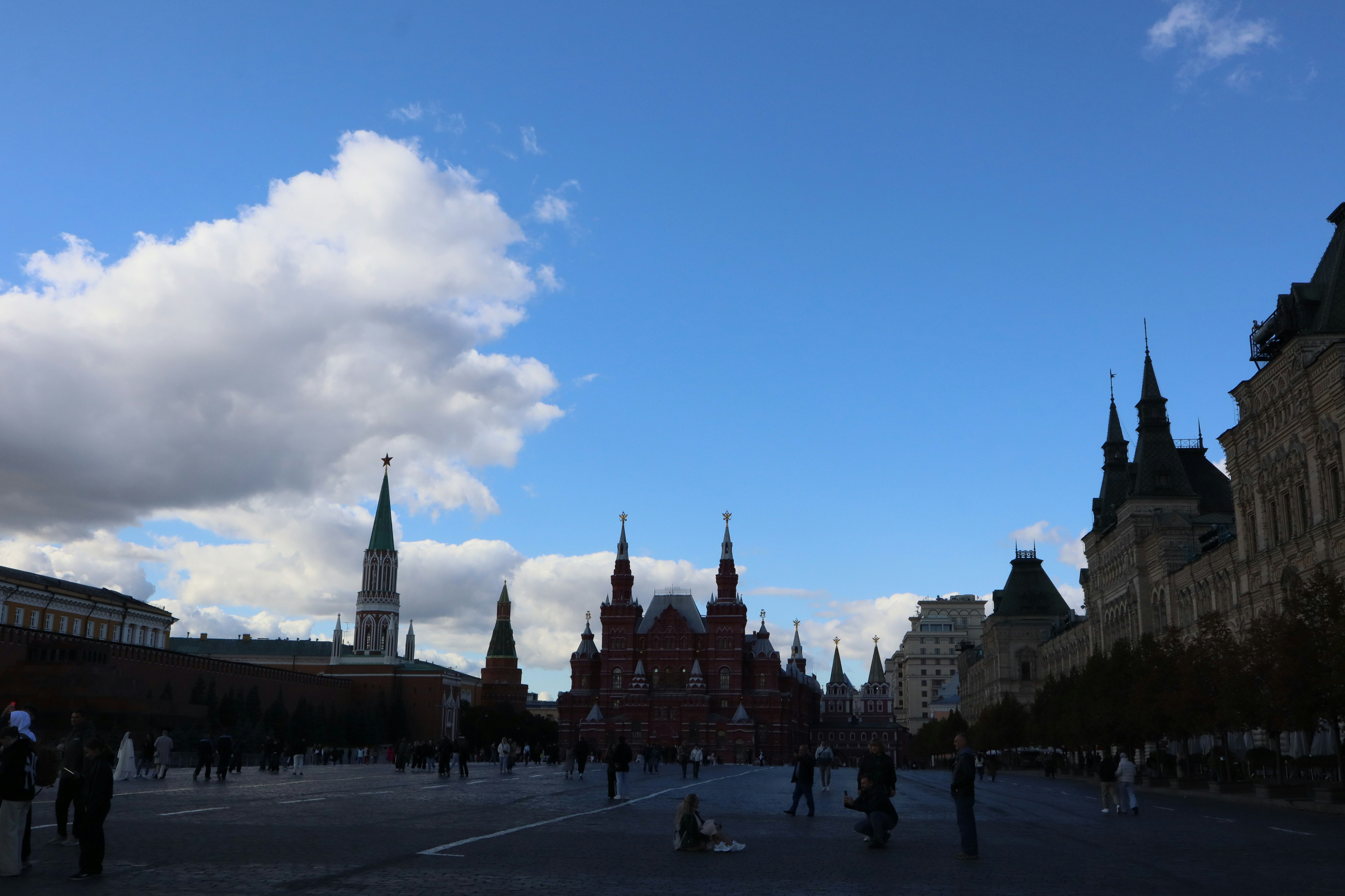 Red square with historic buildings under blue sky