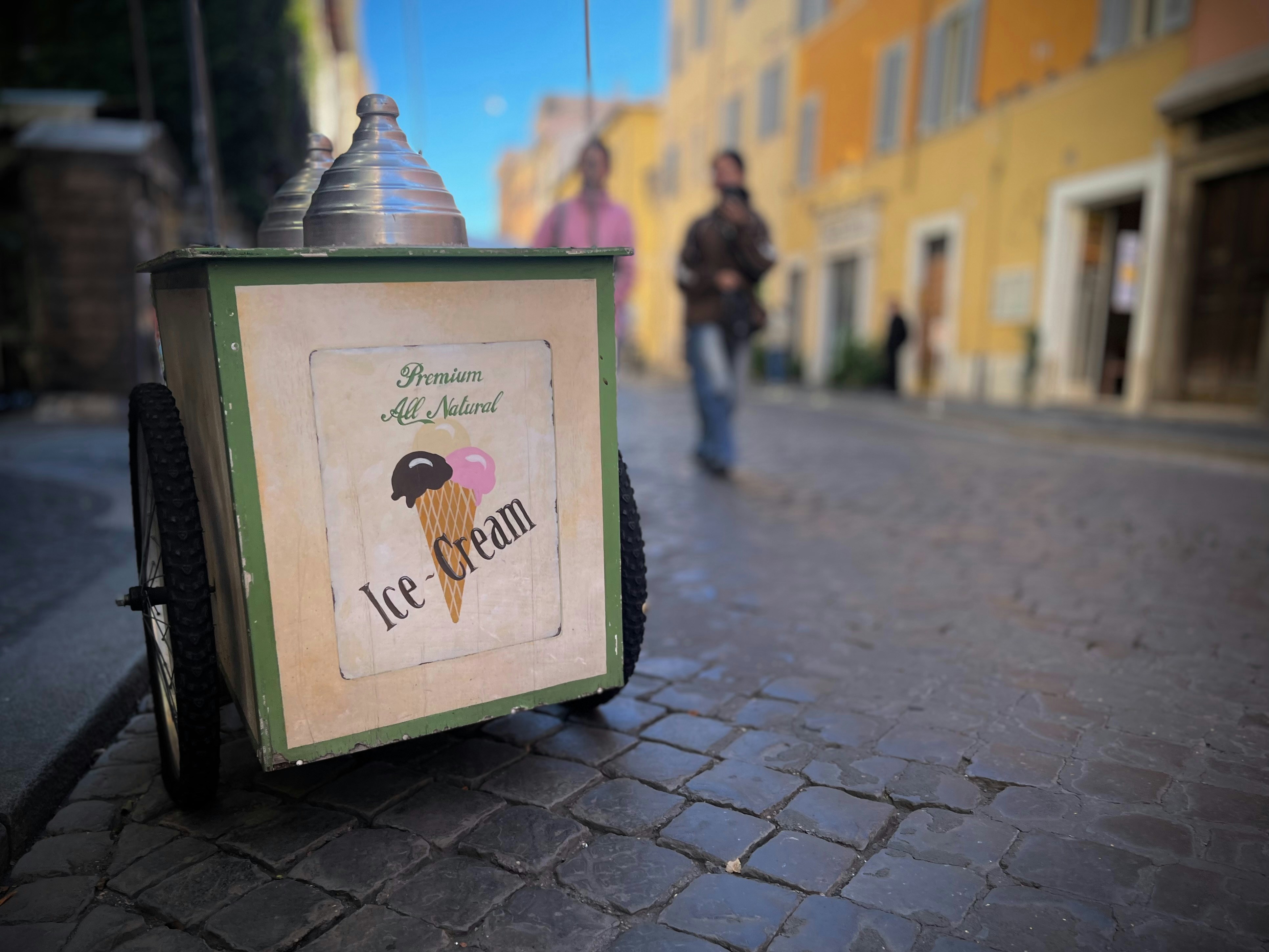 Ice cream cart on a cobblestone street