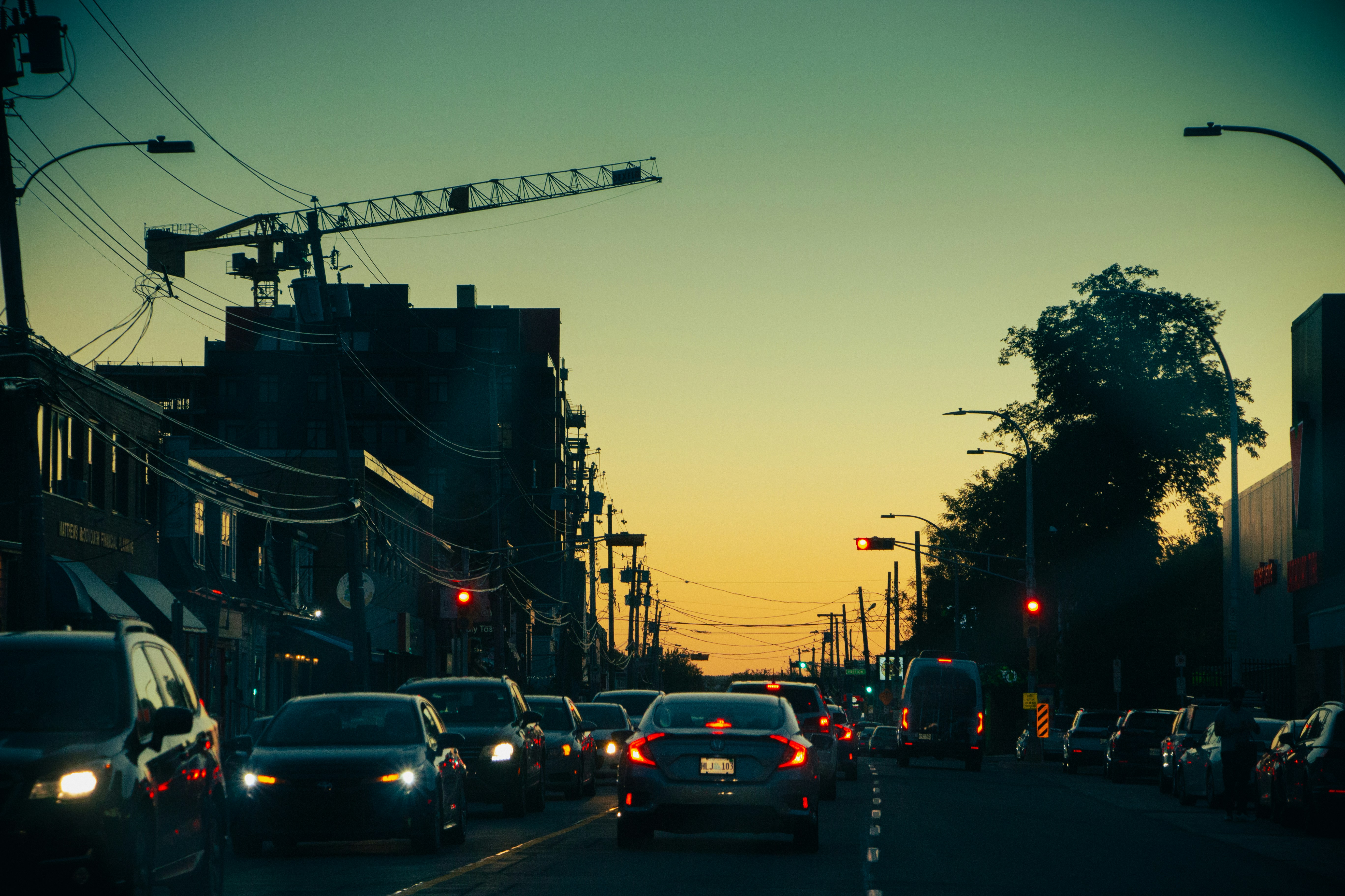 Traffic jam on a city street at dusk.