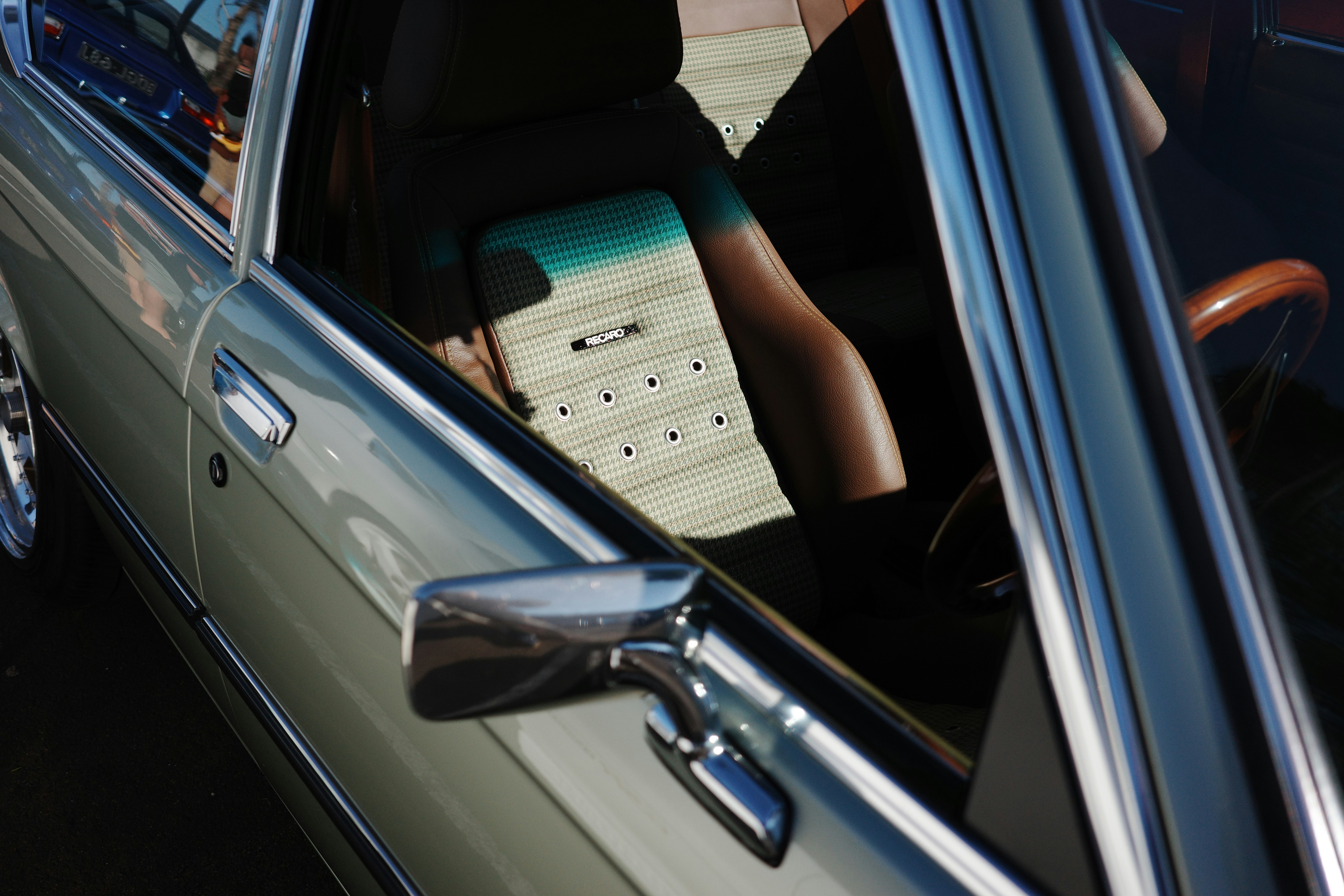 Recaros | Interior view of a classic car with leather seats.