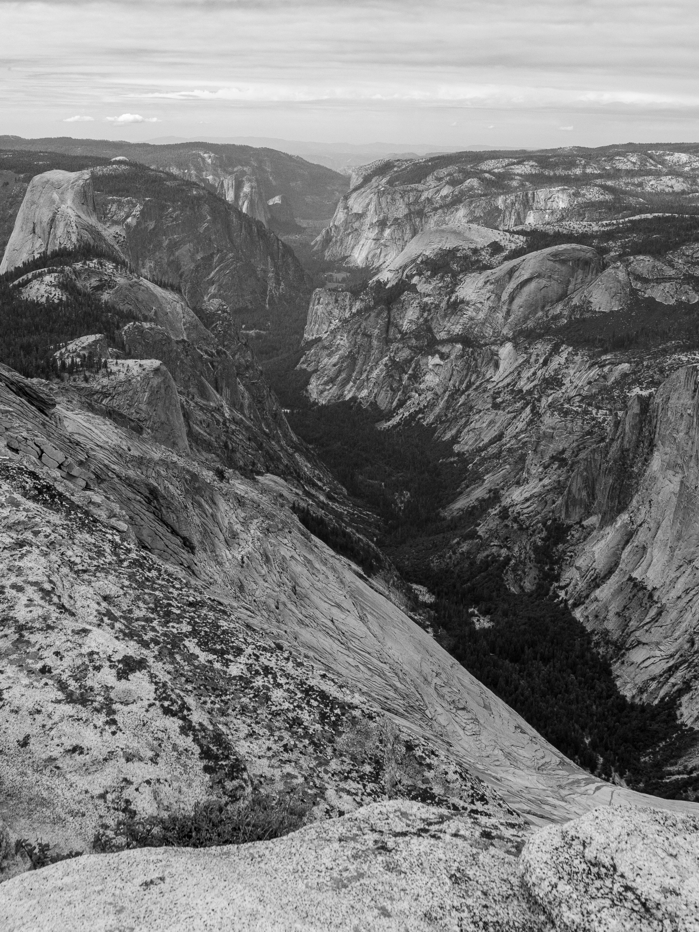Majestic yosemite valley vista with towering granite cliffs