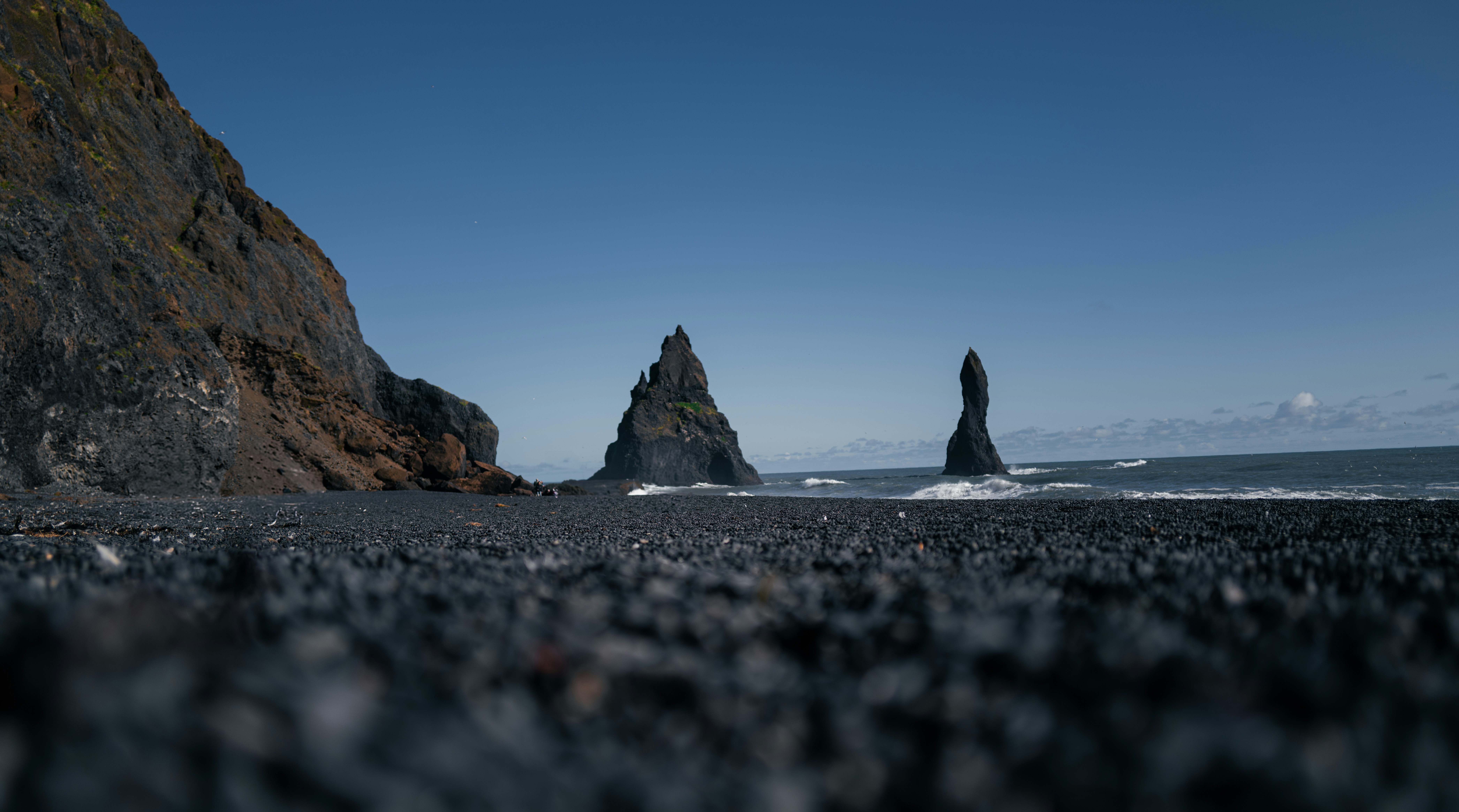 Twin Sea Stacks Rising from a Coastal Veil