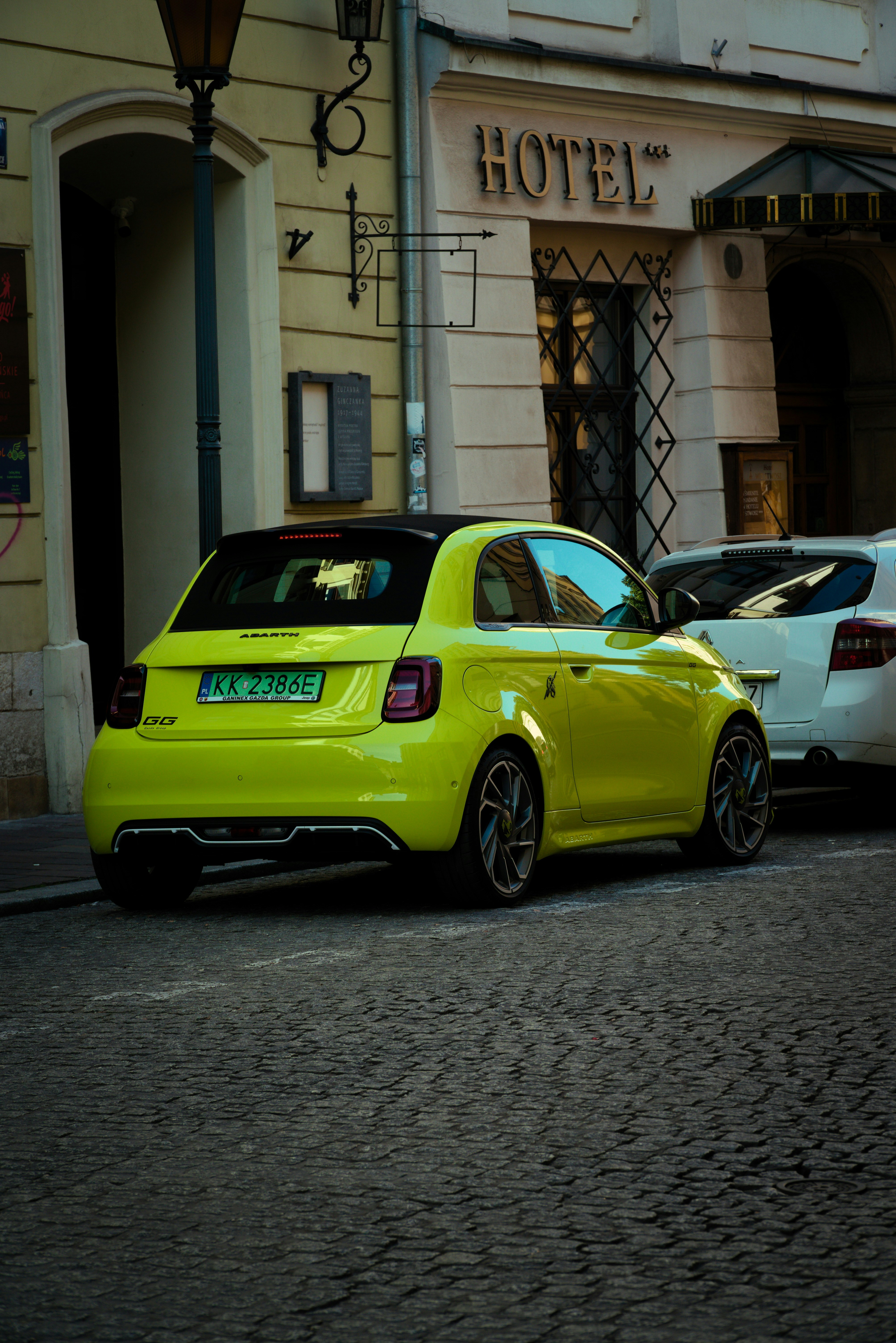 Lime-Hued Hatchback Anchors a Historic European Hotel Street