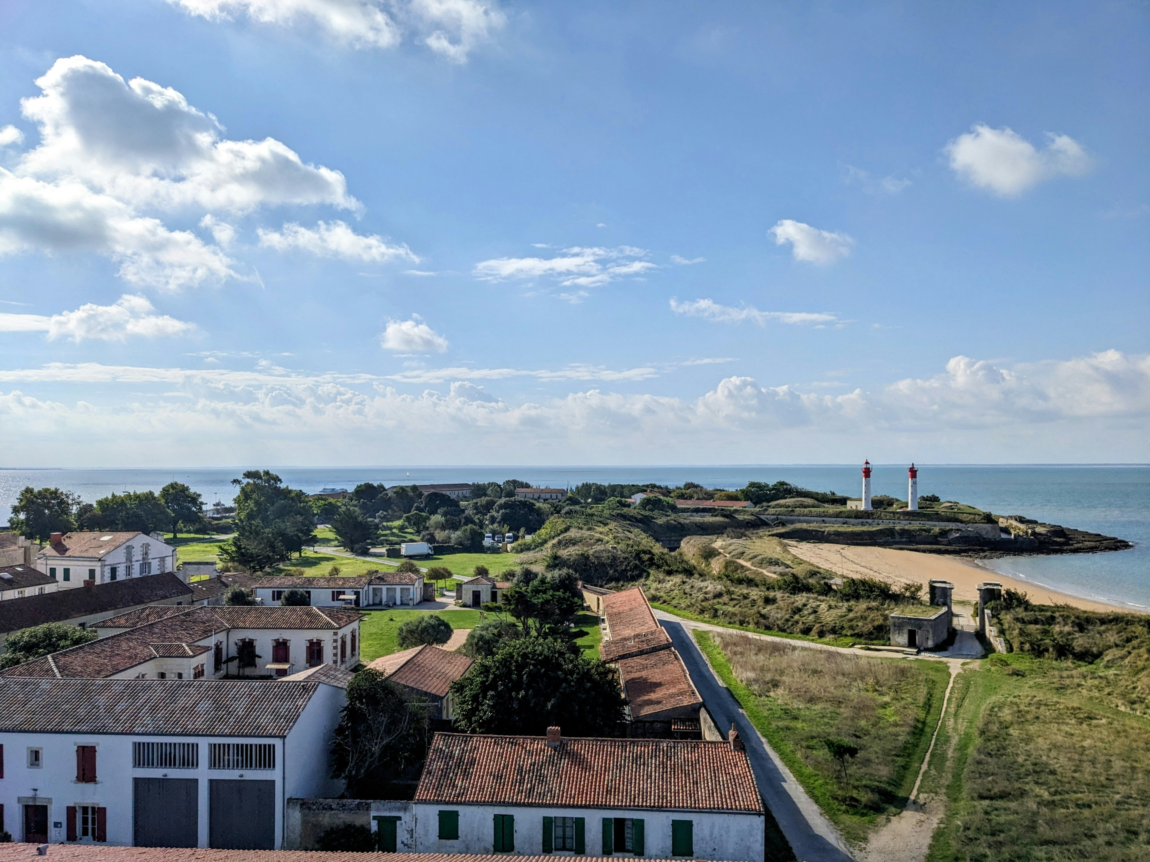 View of the island from the top of the semaphore — 2025 | Coastal village with lighthouses and ocean view