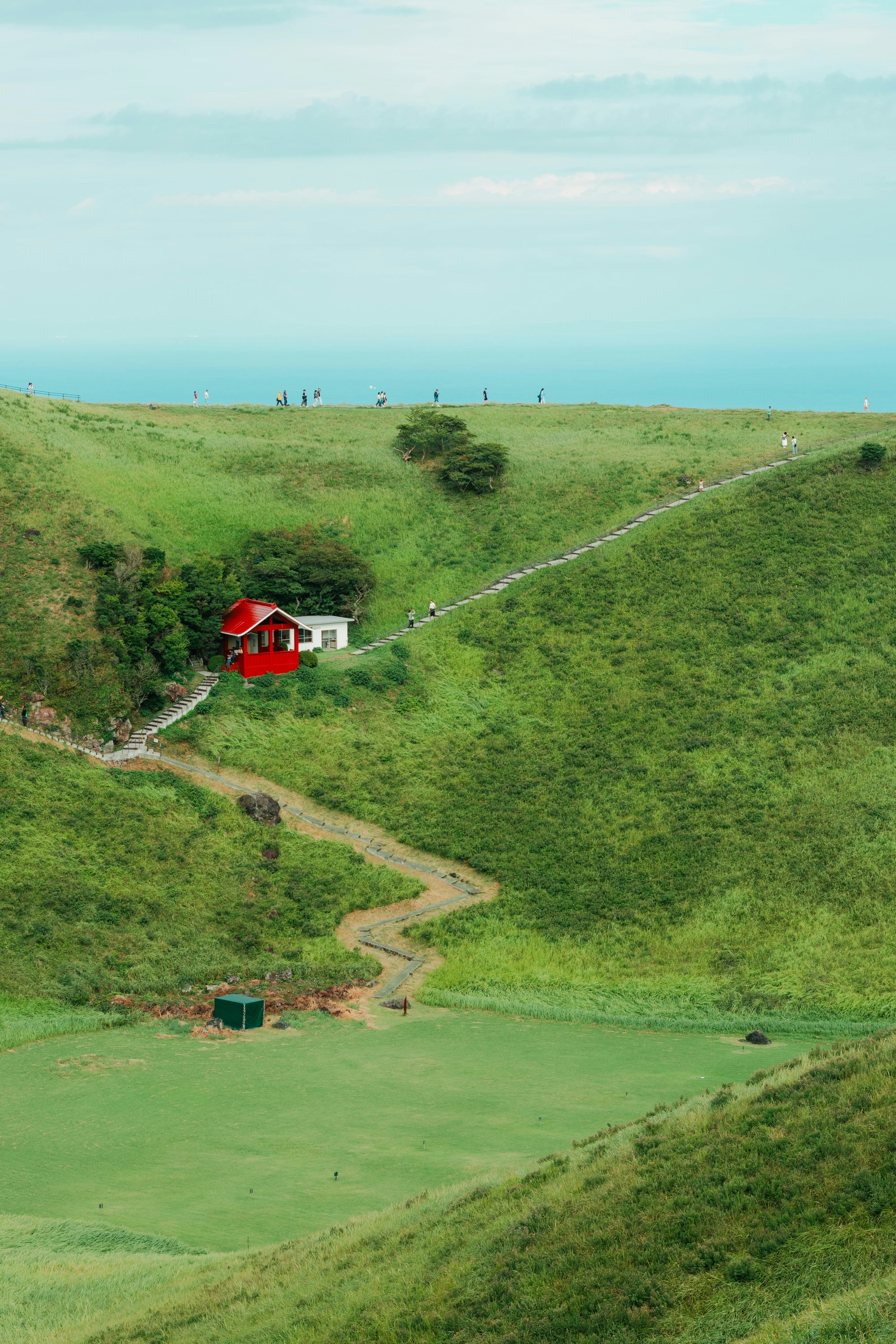 The Scarlet Haven Amidst Verdant Hills