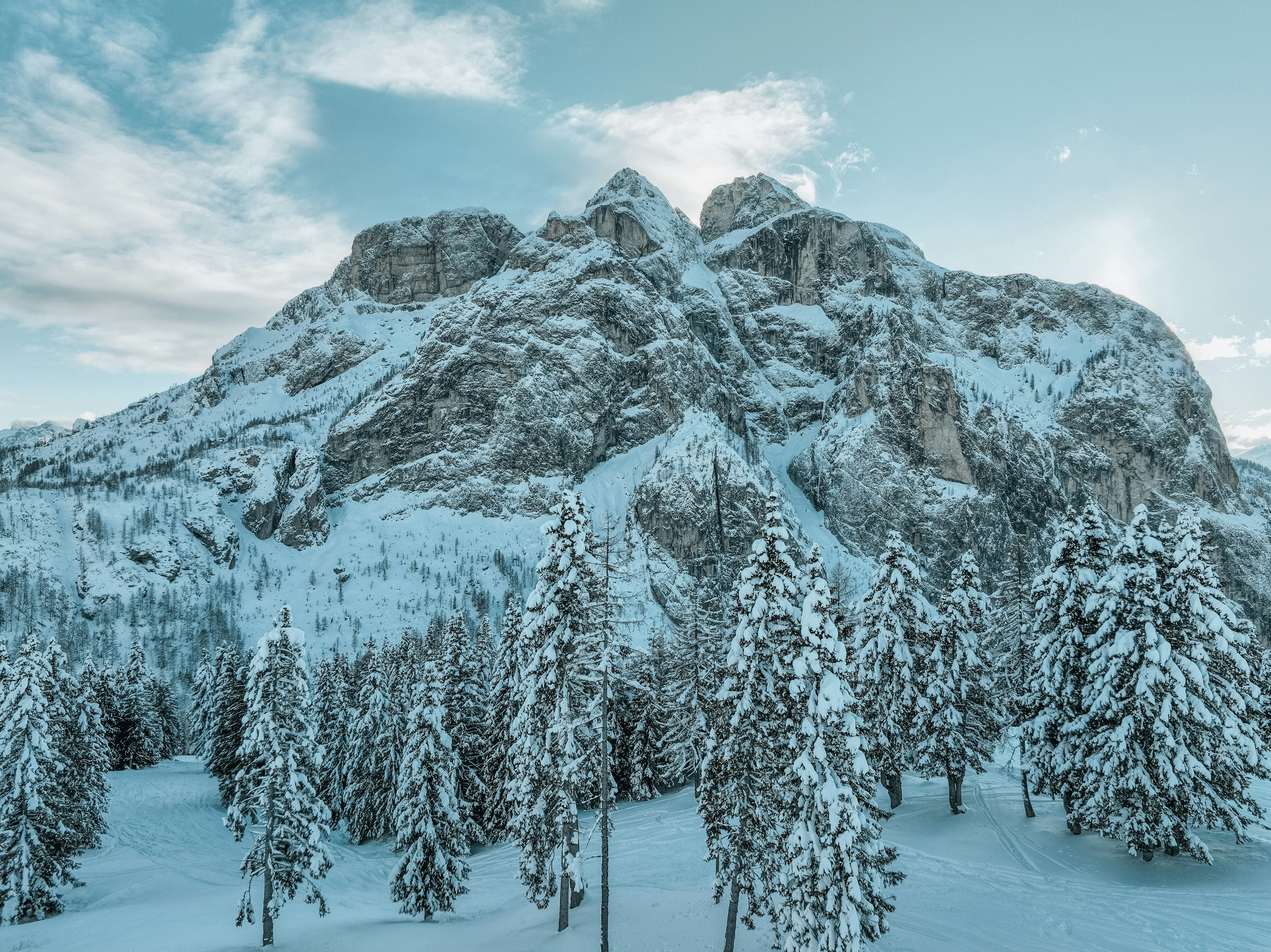 Whispers of Winter: Majestic Peaks in a Frosty Embrace