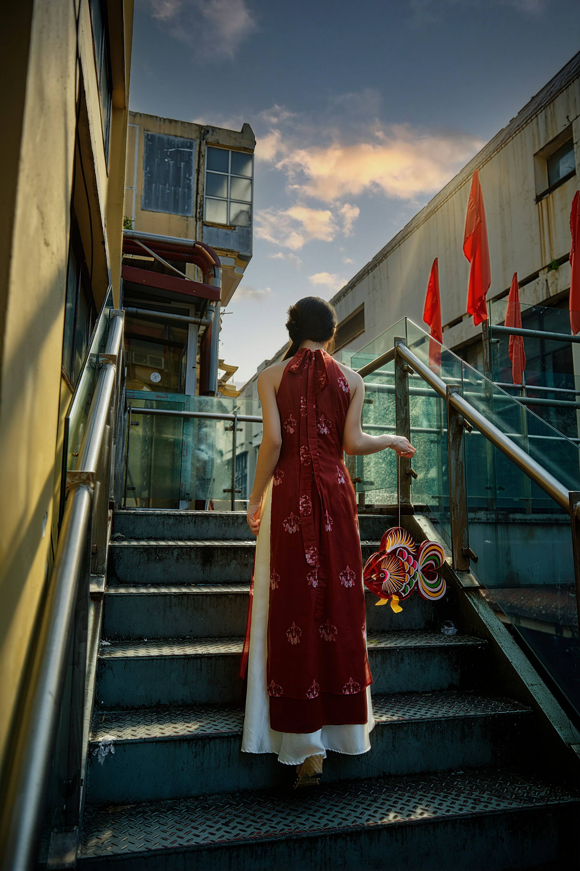 Vietnamese Woman in Red Áo Dài with Lantern in Hanoi Old Quarter