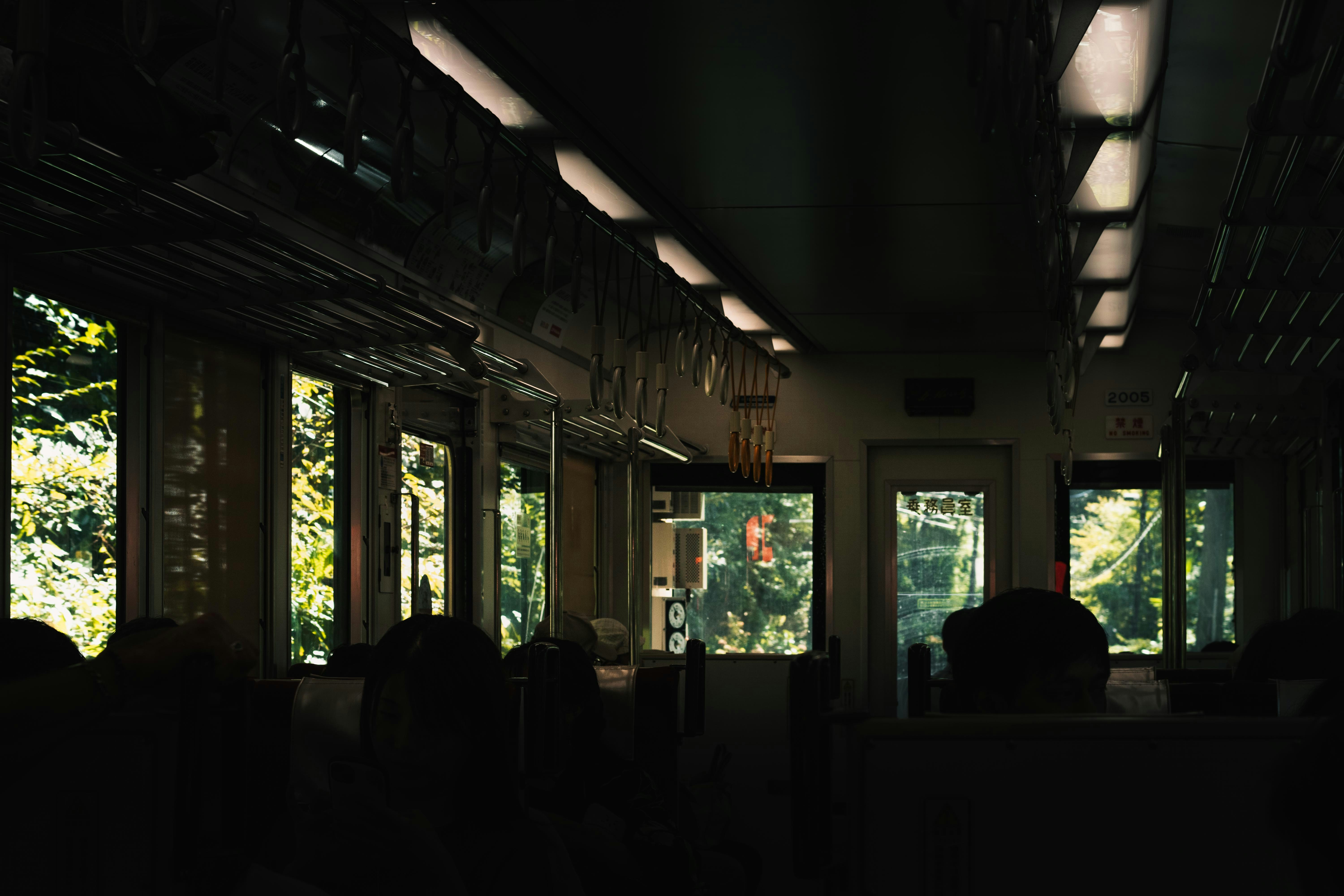 View from inside a train looking out windows