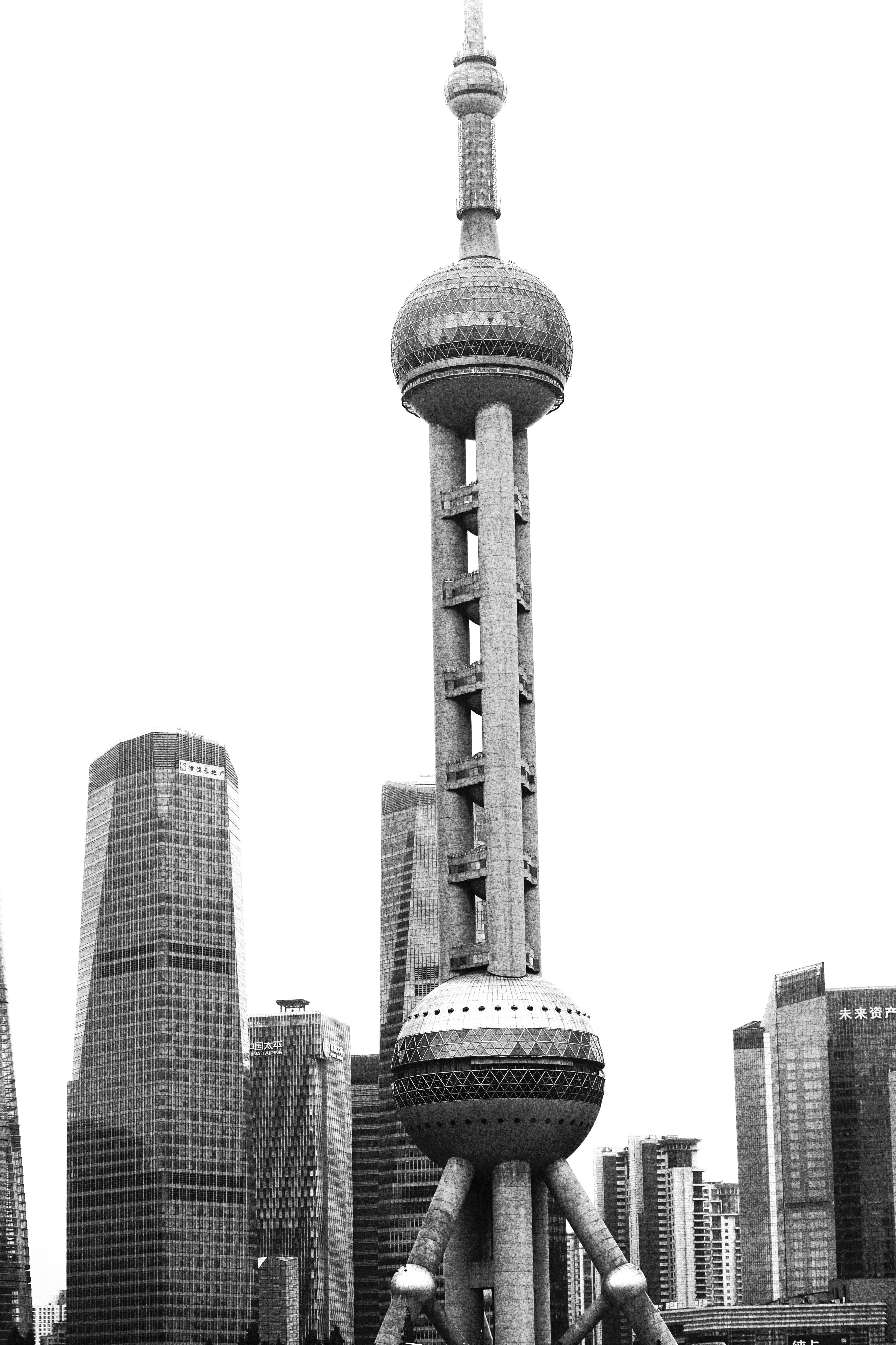 The Tower at Center Stage: A monochrome skyline with the Shanghai Oriental Pearl Tower rising above