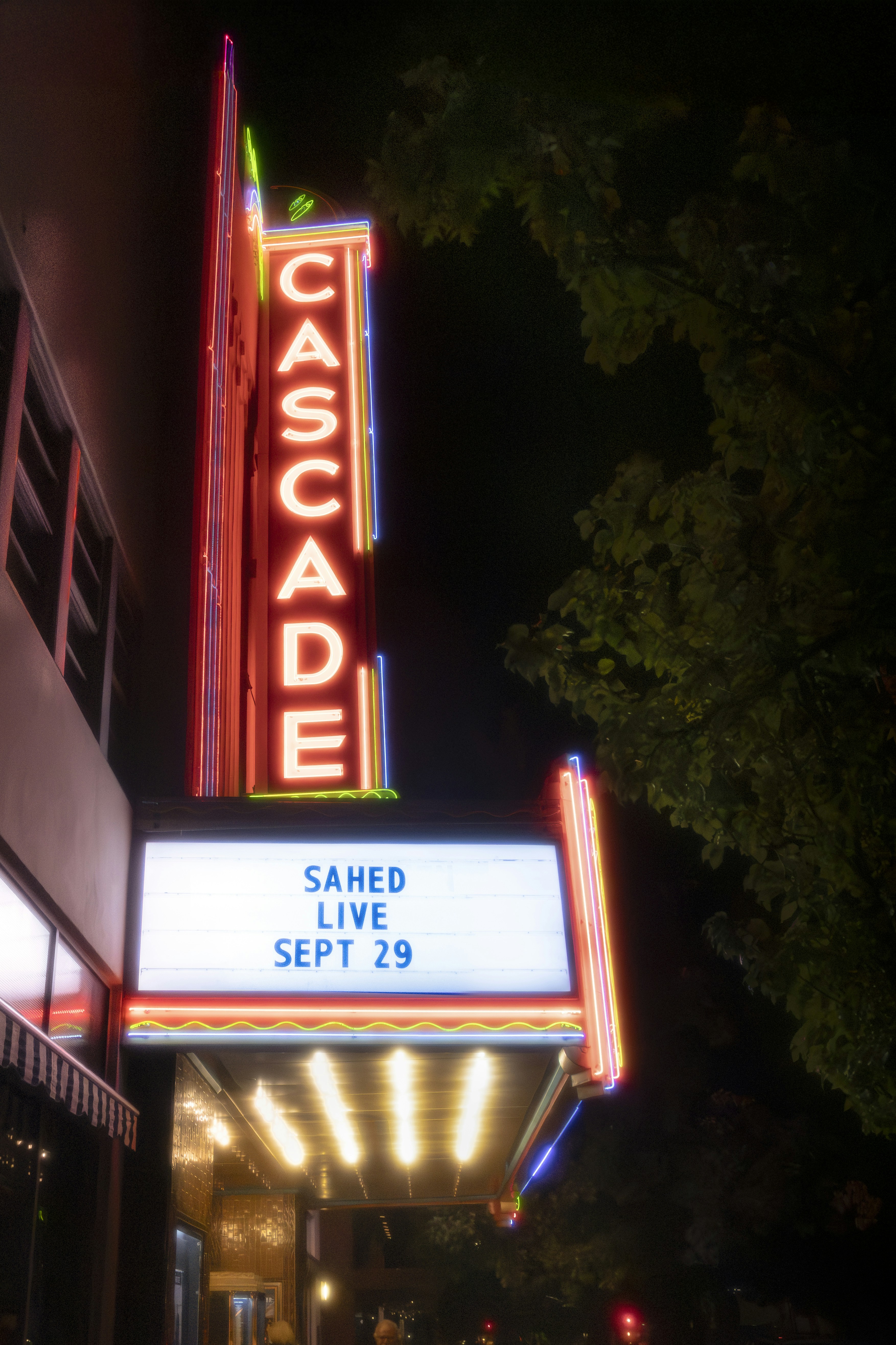 Cascade theatre marquee at night with event details. photo – Free Night ...