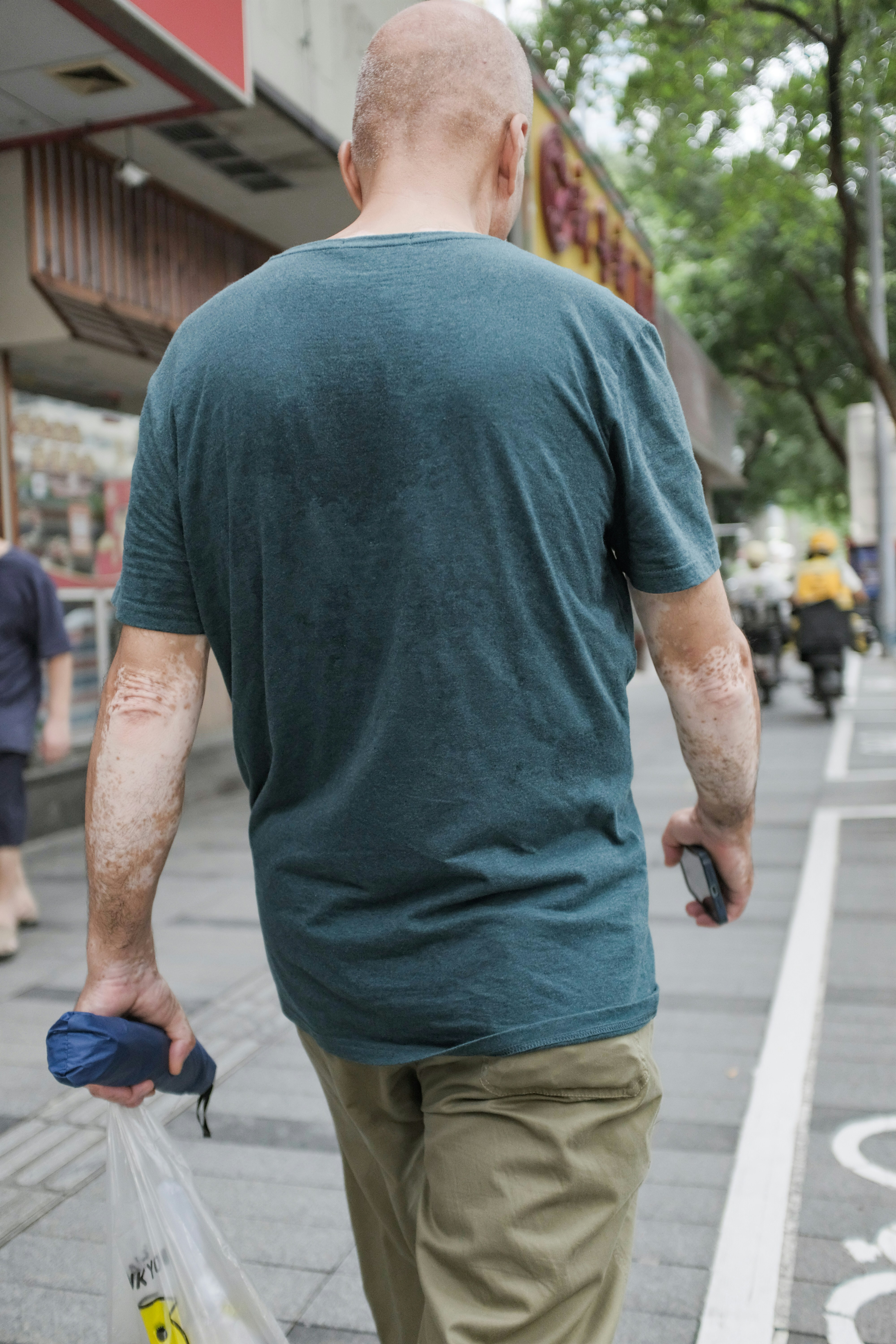 Urban Stroll: A Moment of Reflection