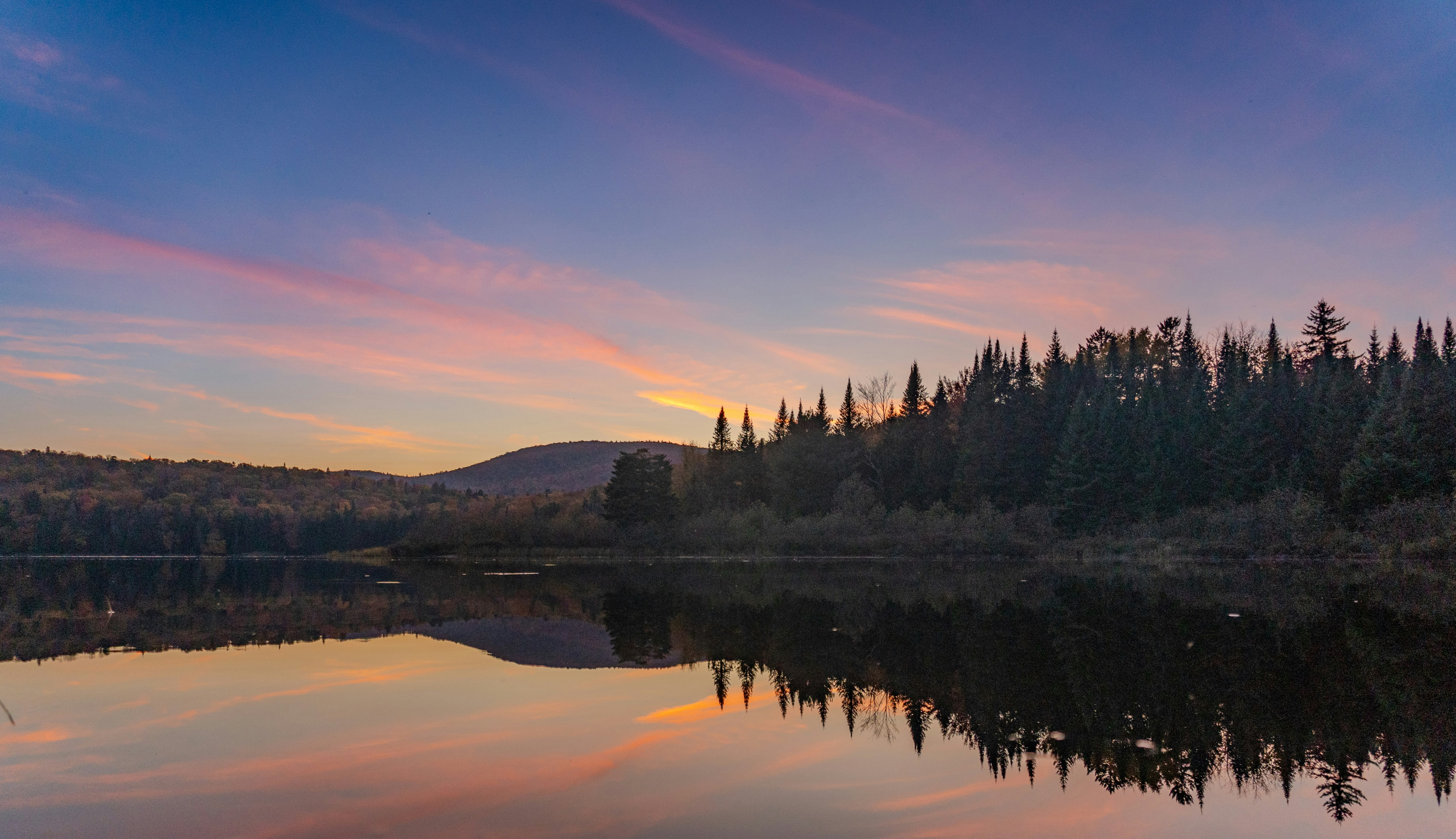 Twilight Reflections Over Serene Waters