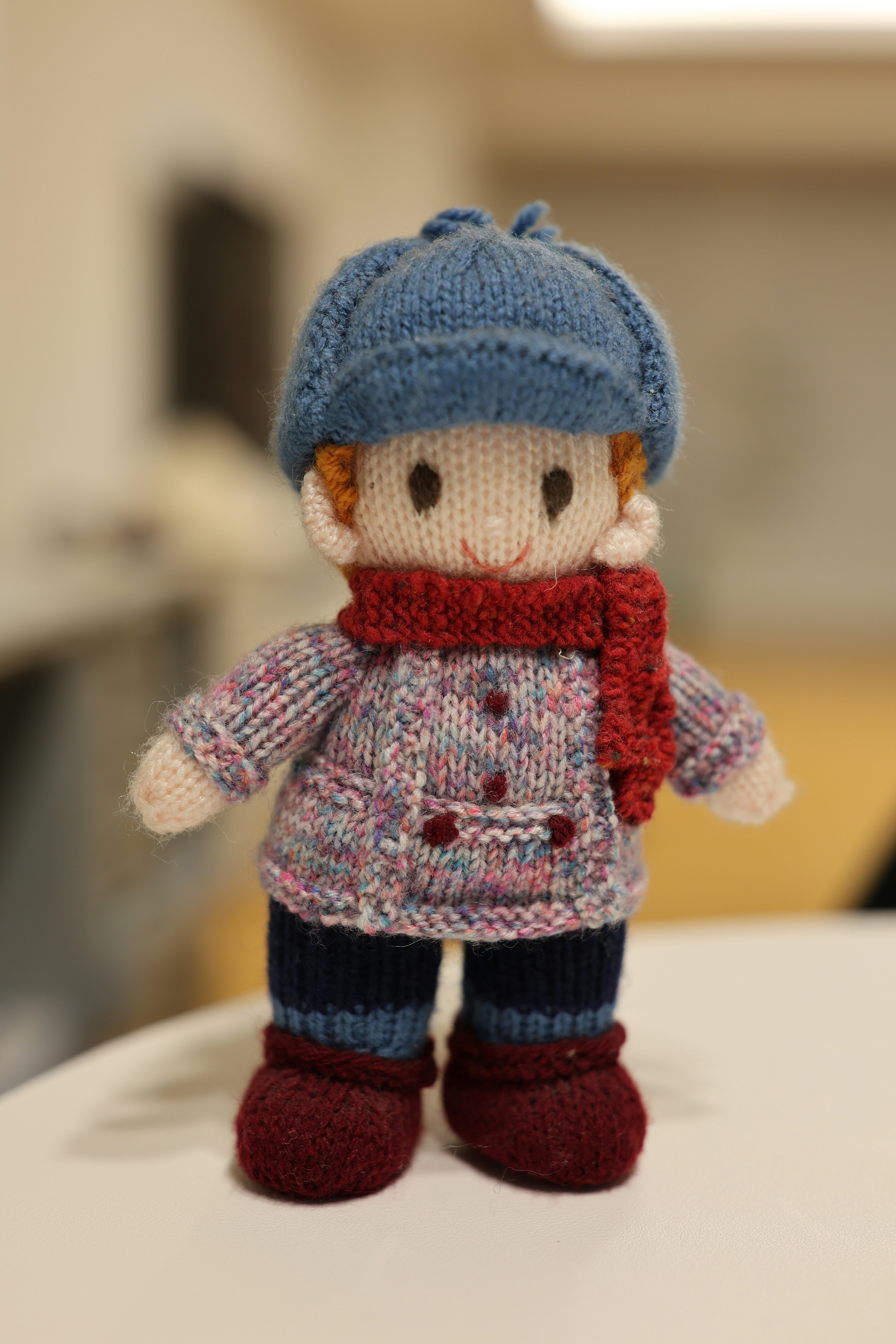 Whimsical Knit Companion in Cozy Attire