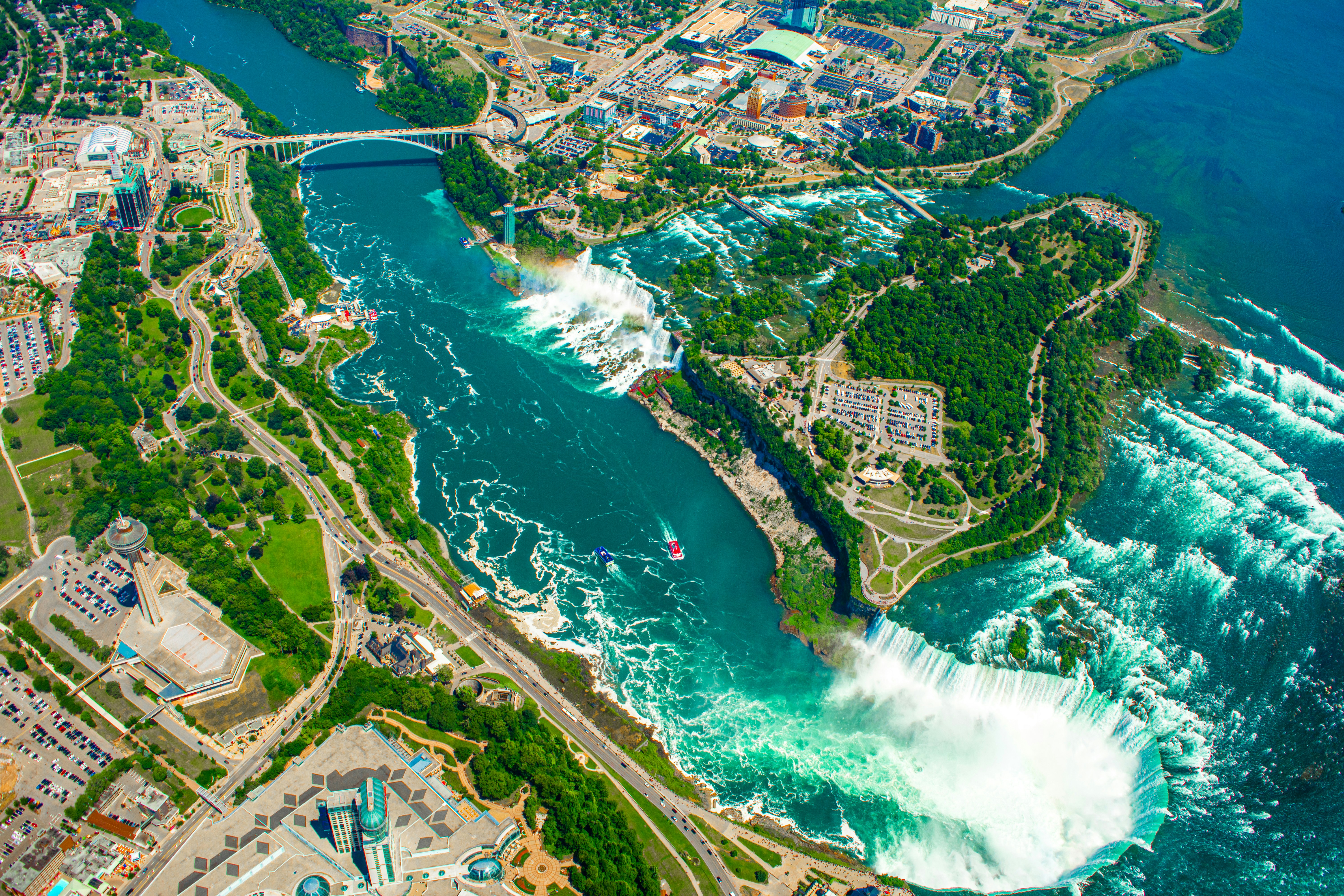 Arieal Shot of Horse shoe Bend - Niagara Falls | Aerial view of niagara falls with surrounding city and river