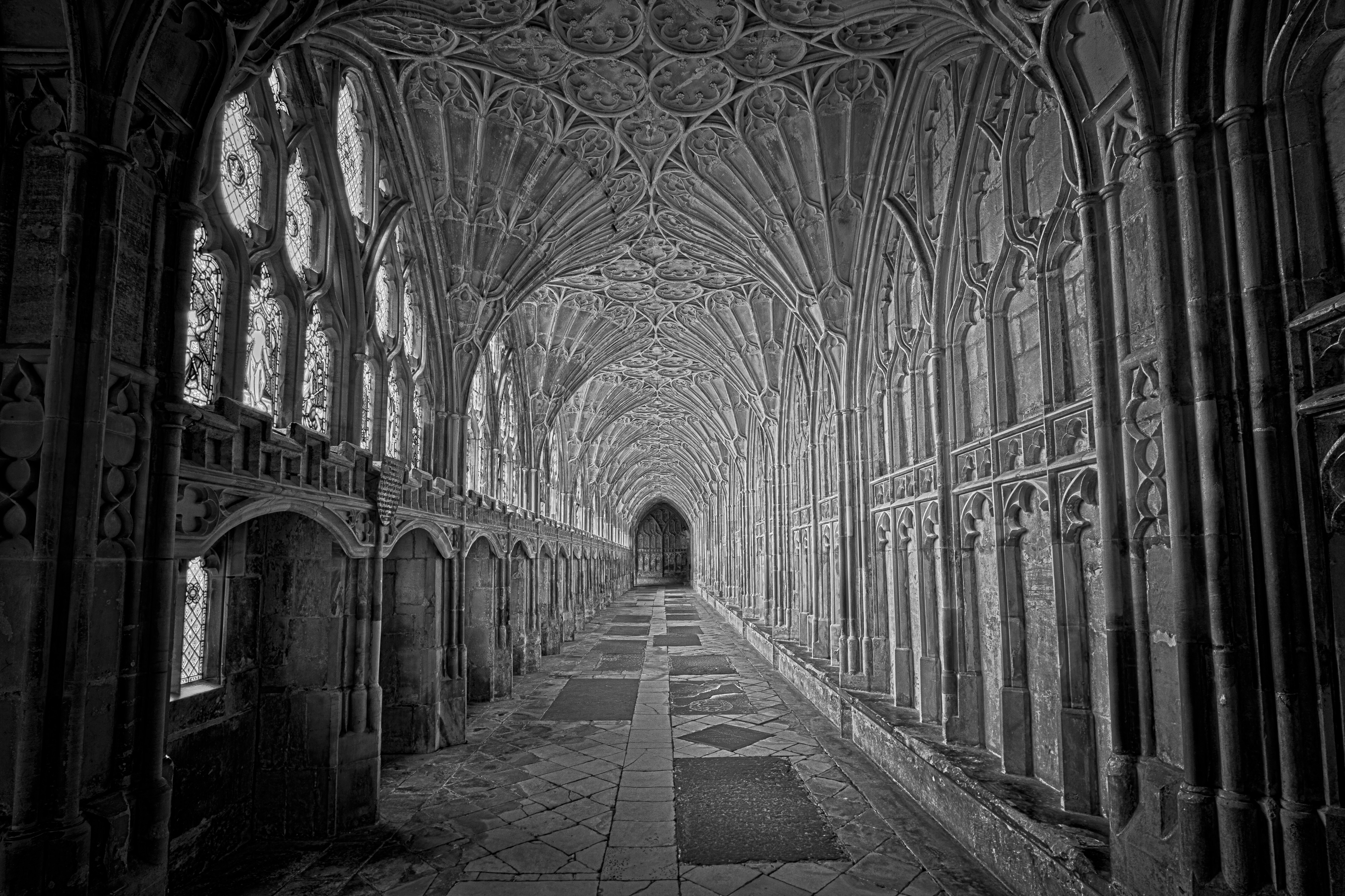 Michael Beckwith www.beckwithphotography.com | Ornate gothic hallway with arched windows and vaulted ceiling