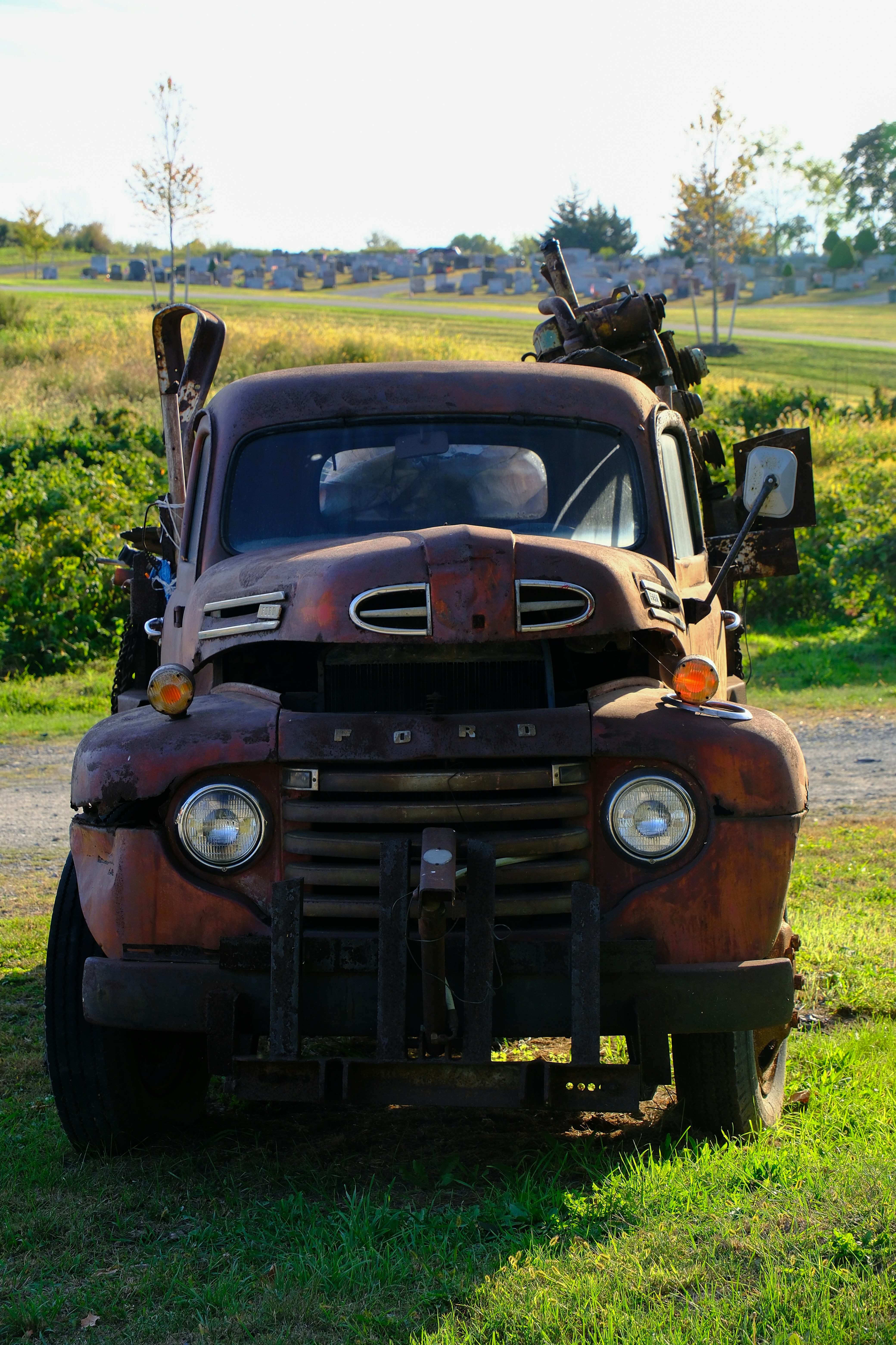 Rusty old ford truck parked outdoors
