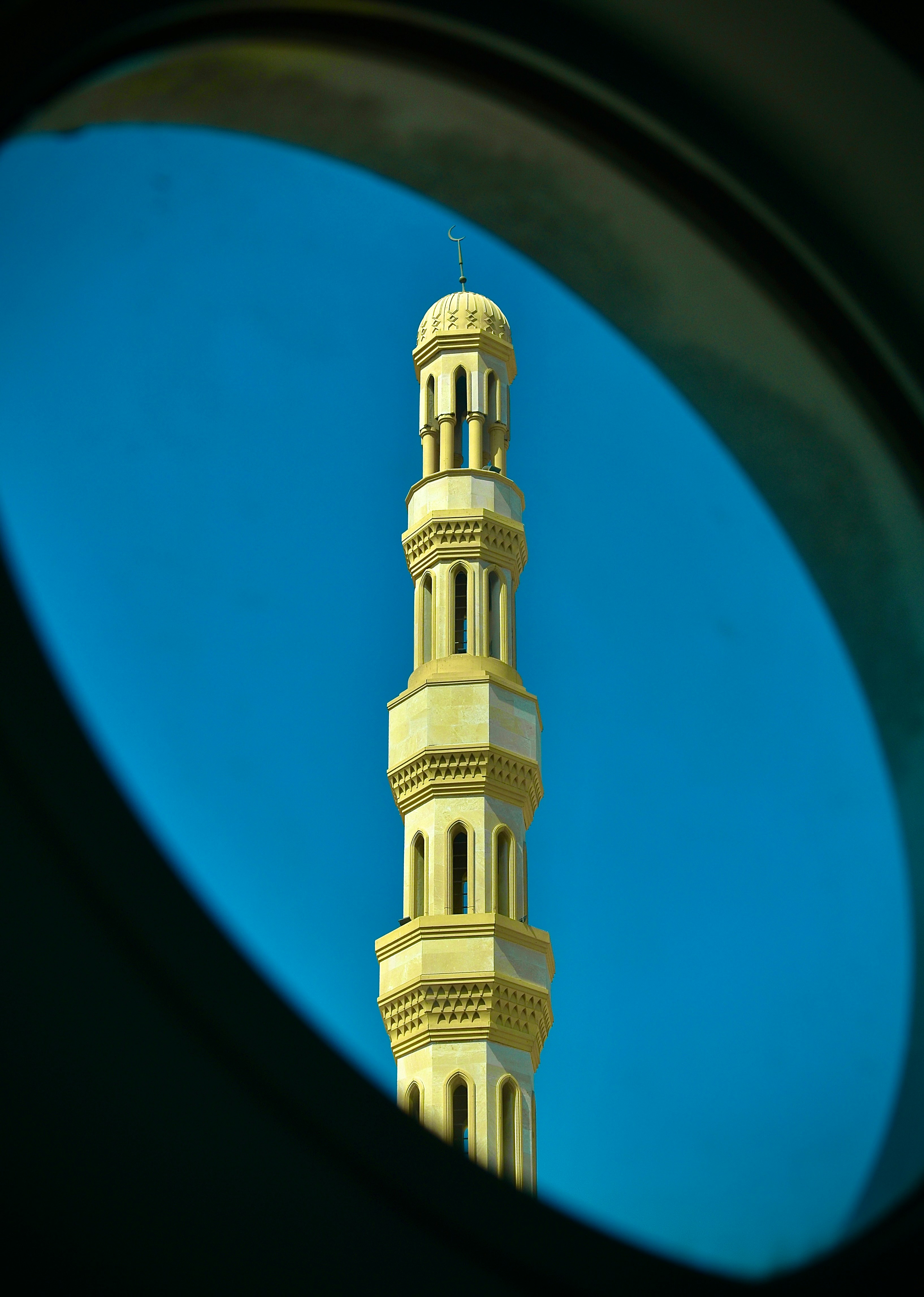 Golden Minaret Against Azure Skies